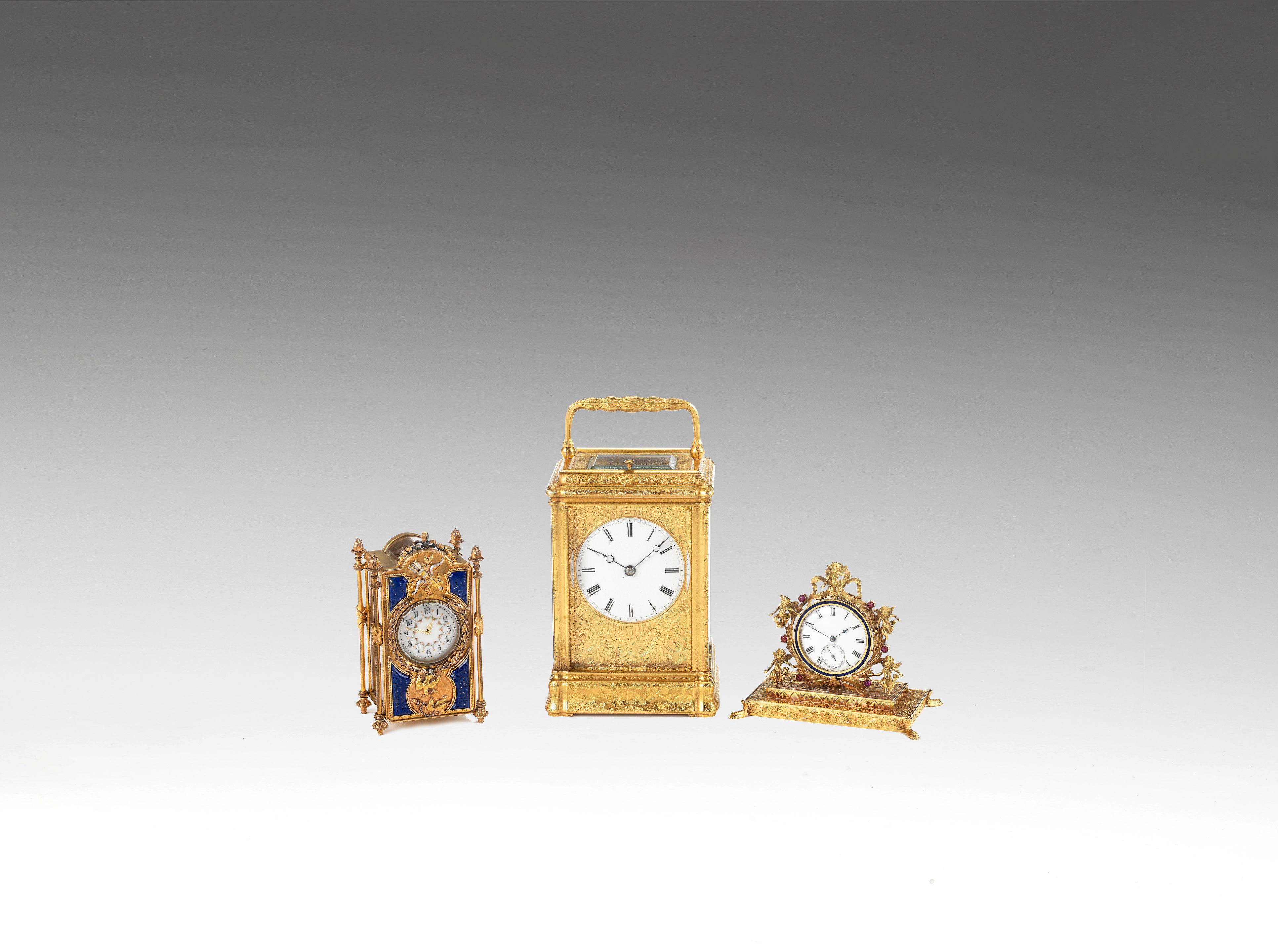 Bonhams : An early 20th century yellow metal and ruby boudoir timepiece