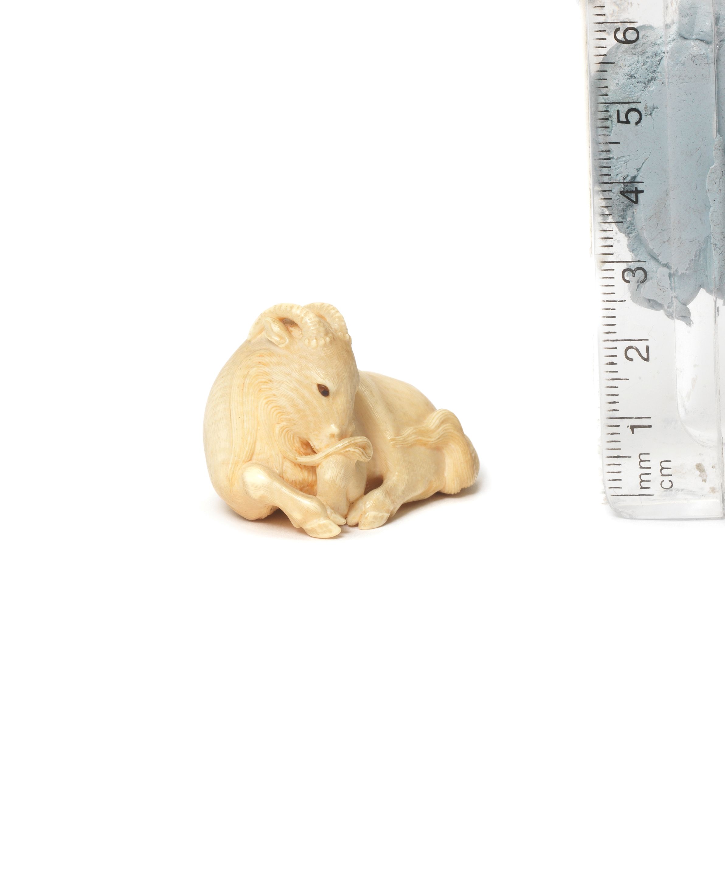 Bonhams : An ivory netsuke of a recumbent goat By Tetsugen Kyusai (1879 ...