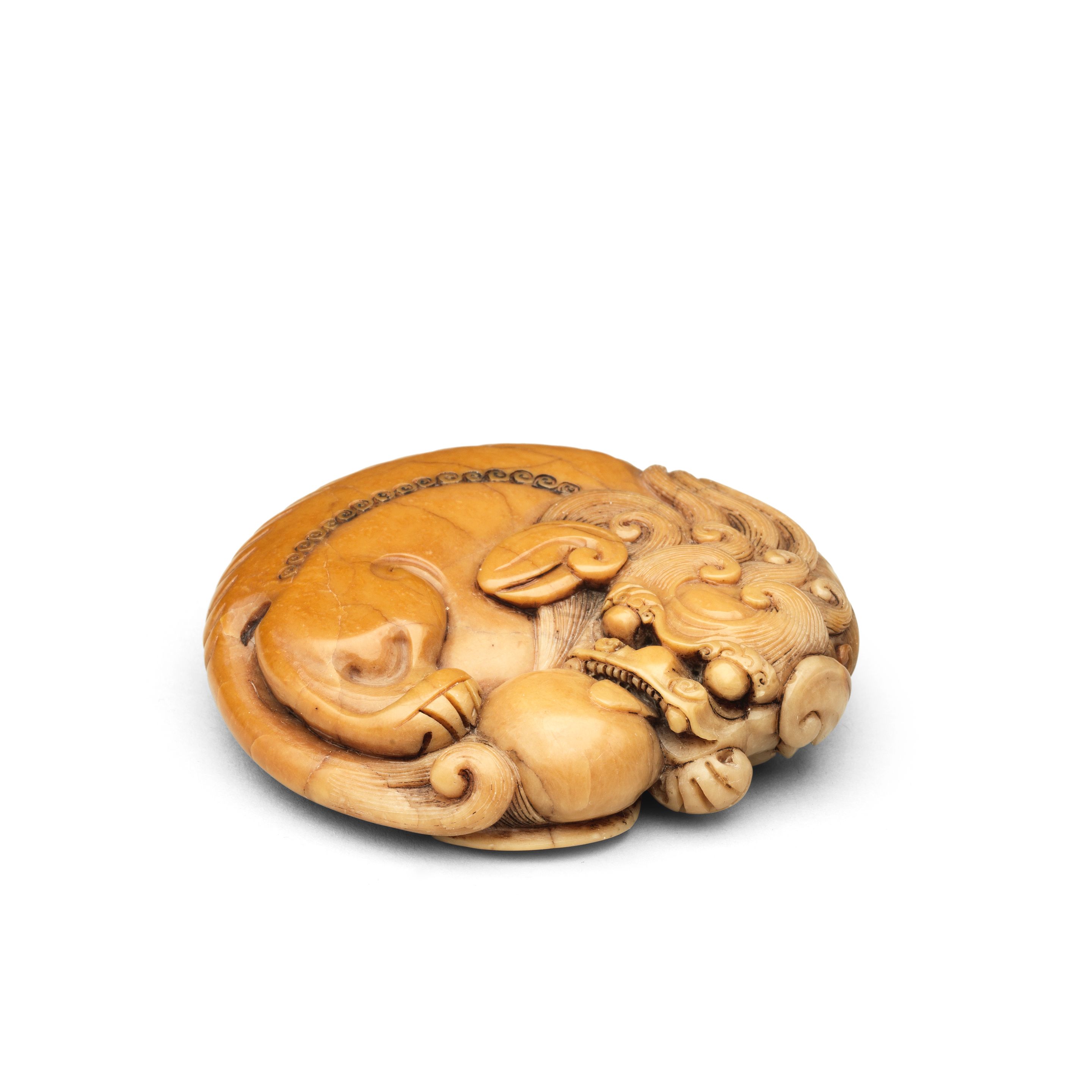Bonhams : A soapstone 'Buddhist-lion' scroll weight 18th/19th century