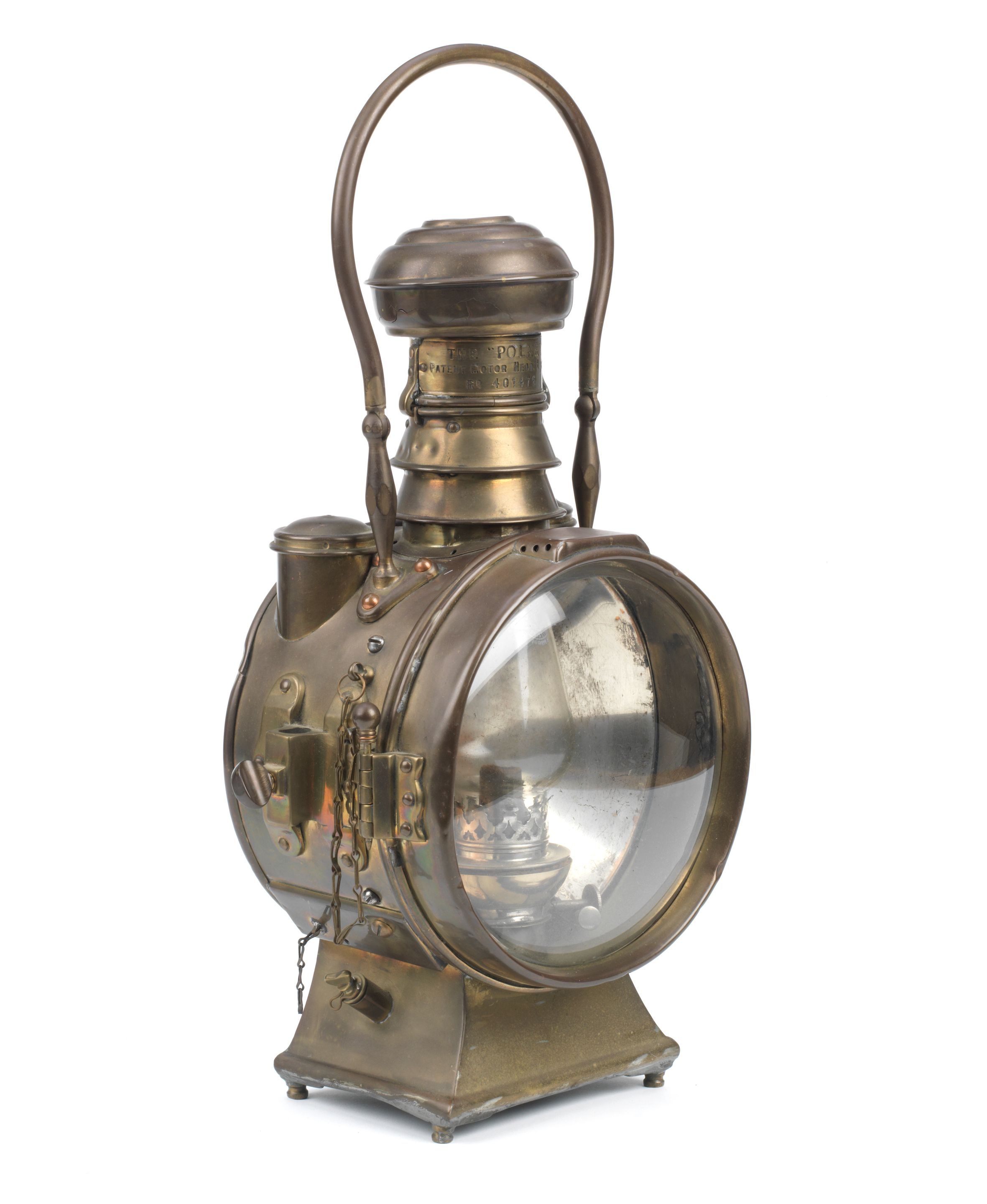 Bonhams Cars : A The Polkey oil-illuminating headlamp,