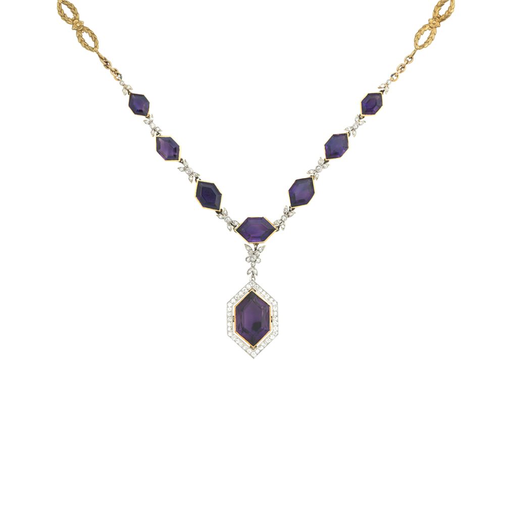 Bonhams : An amethyst and diamond pendant necklace, composite