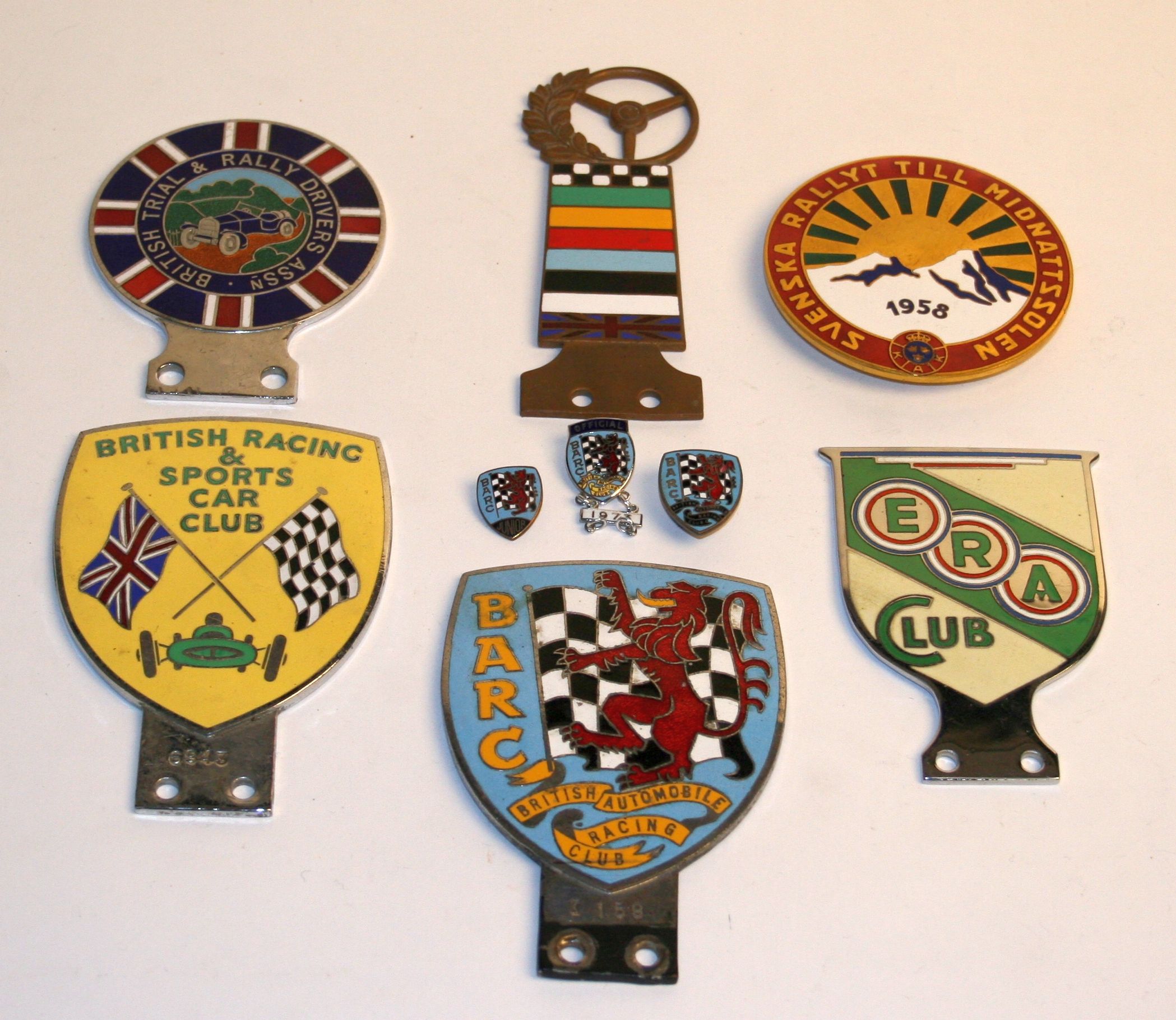 Bonhams Cars : Six Motorsport car badges, ((9)) ((9))