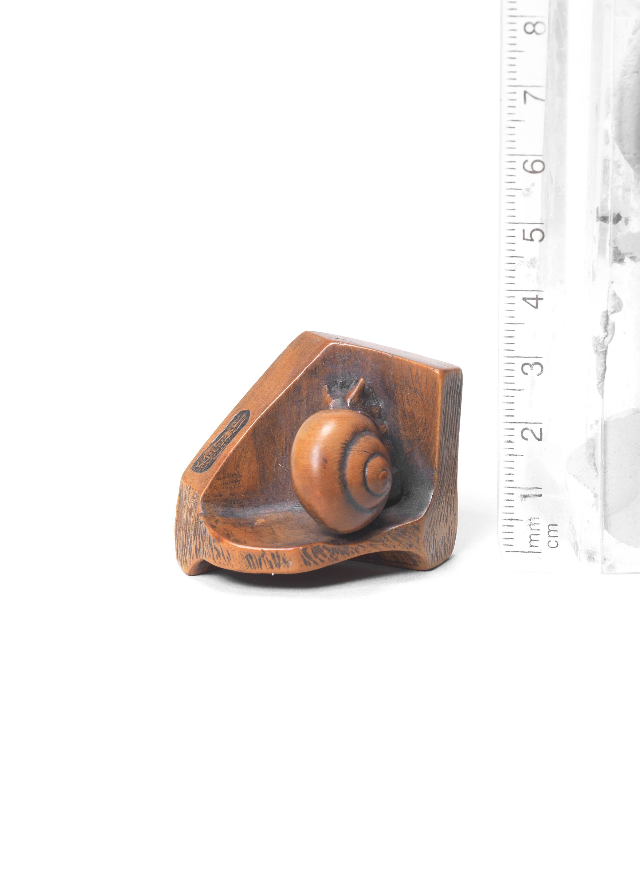 Bonhams : A boxwood netsuke of a snail on bamboo By Shokiku, early 19th ...