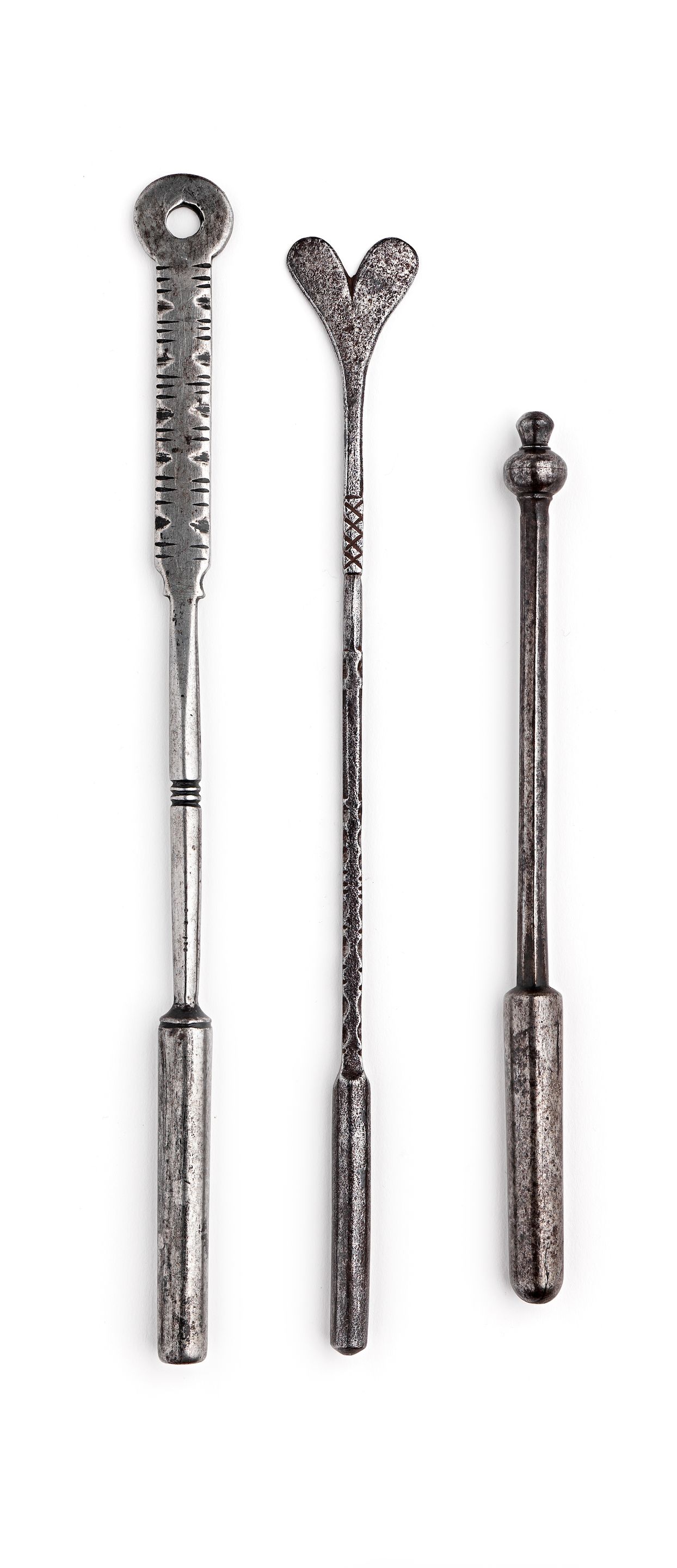 Bonhams : Three wrought steel poking sticks, British (3)