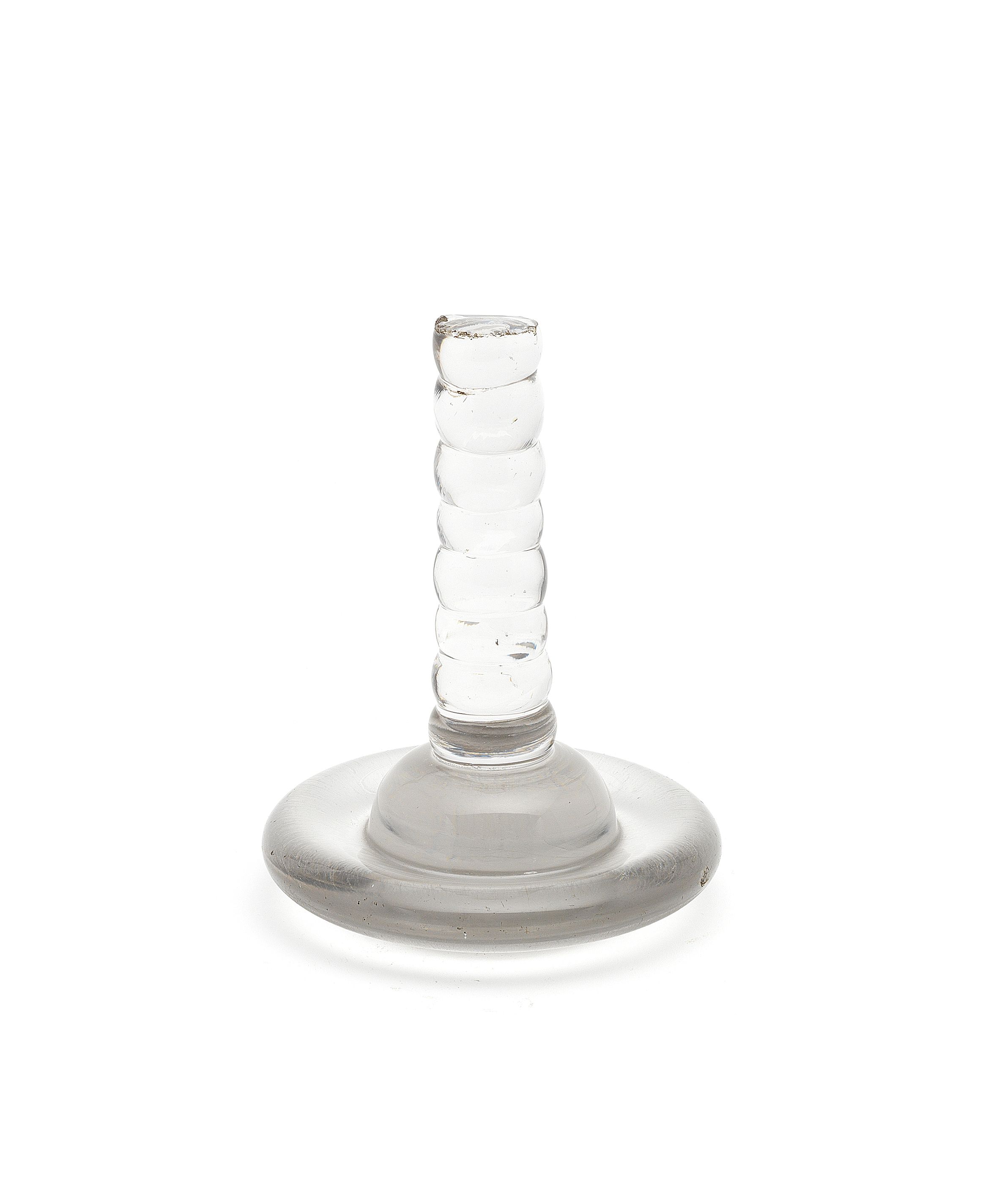 Bonhams : A lead glass linen smoother, British, circa 1700-1800