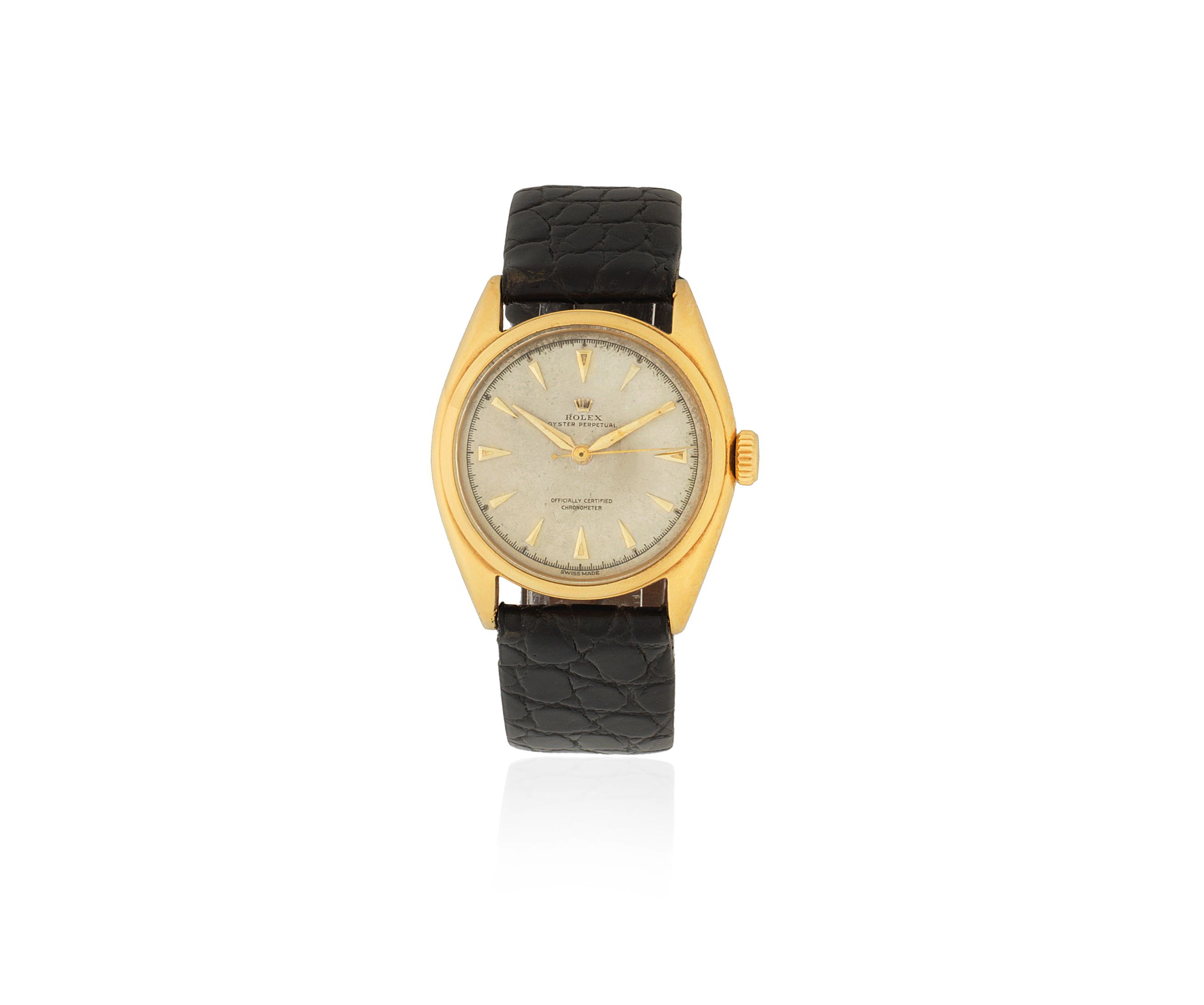 Bonhams : Rolex. An 18K gold automatic wristwatch Oyster Perpetual, Ref ...