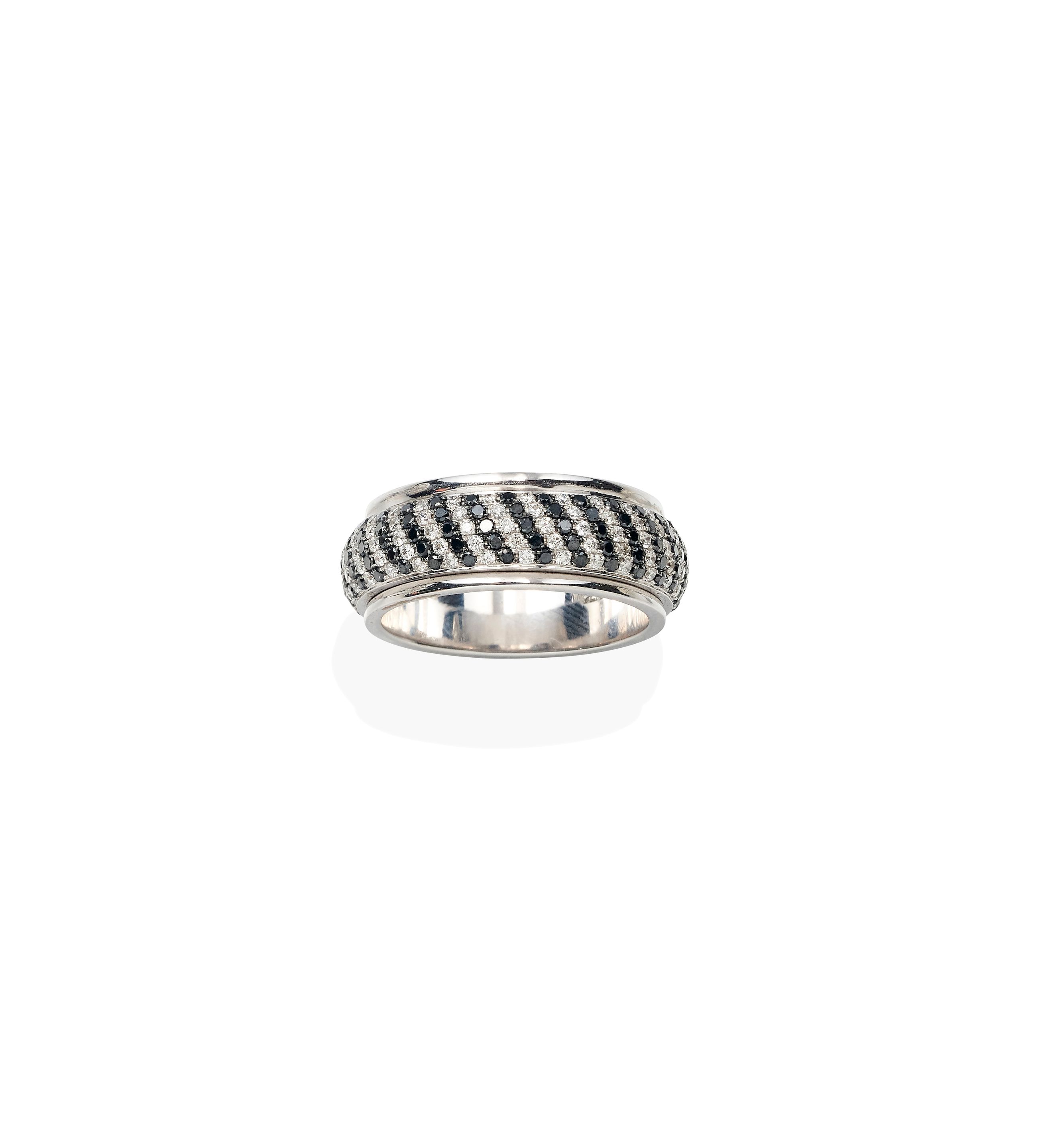 Bonhams : A coloured diamond and diamond 'swivel' ring, by Cerrone
