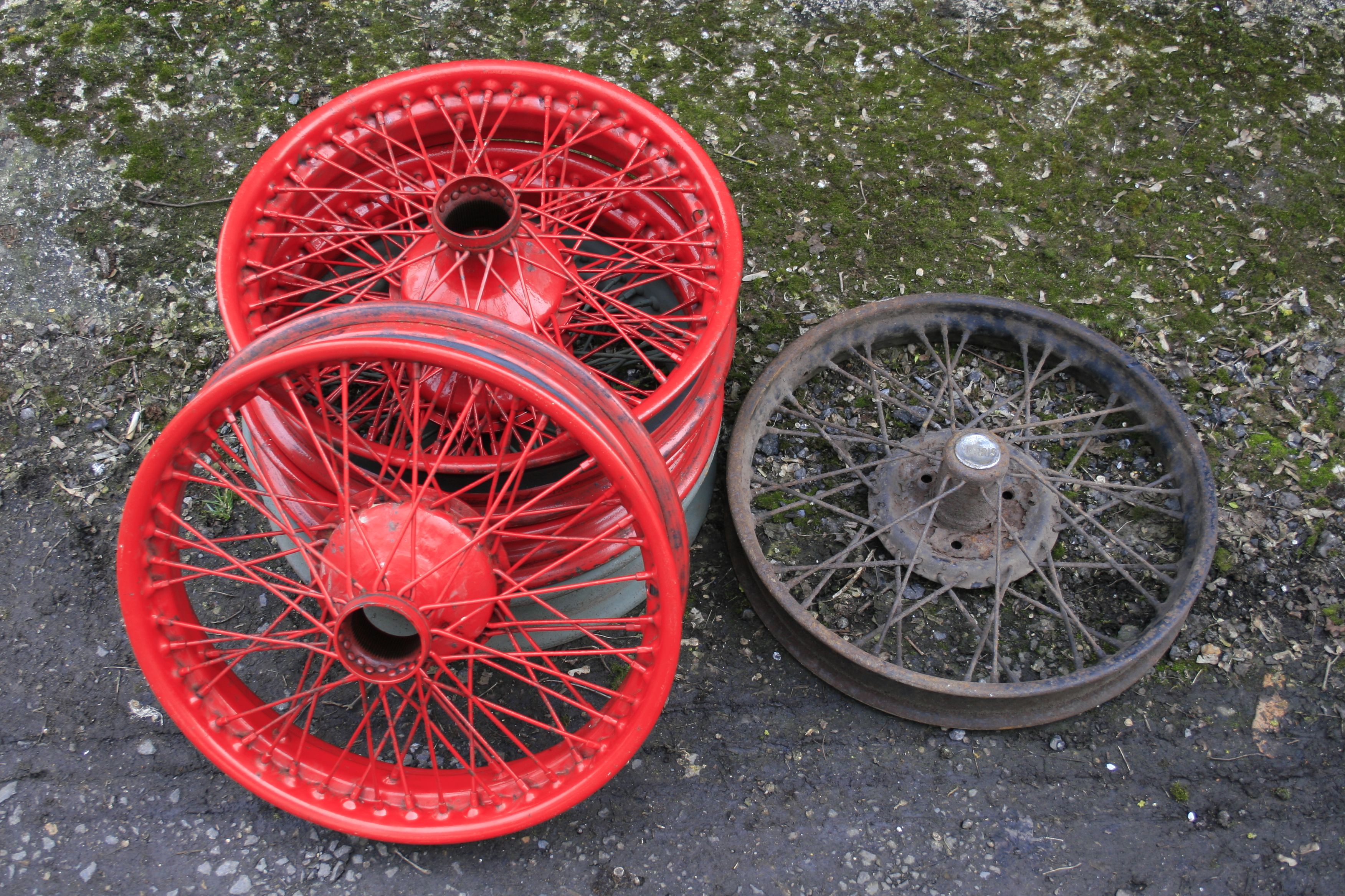 Bonhams Cars : Three 19½ inch diameter wire spoked wheels, ((5))