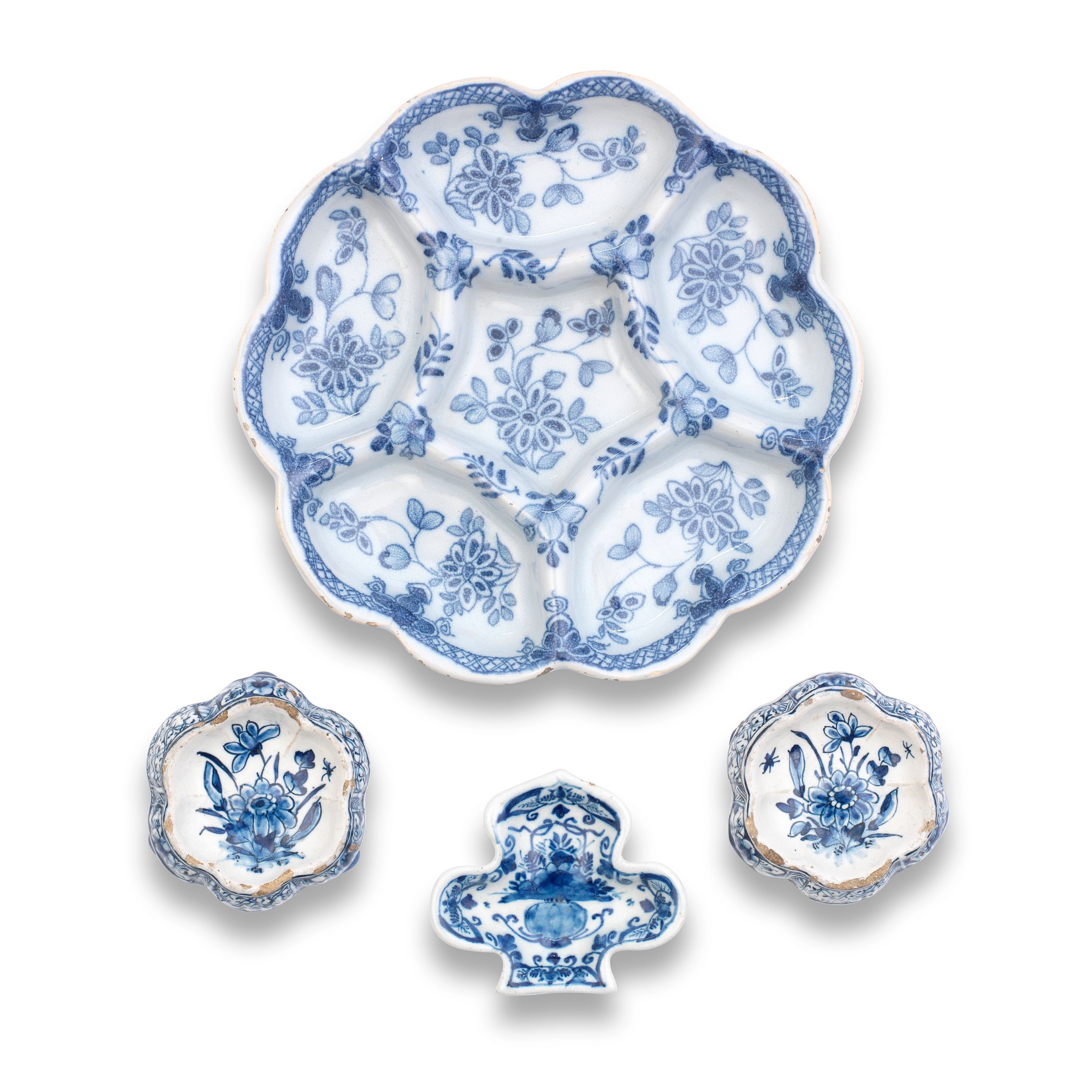 Bonhams : A London delftware hors d'oeuvres tray, a delftware pickle ...
