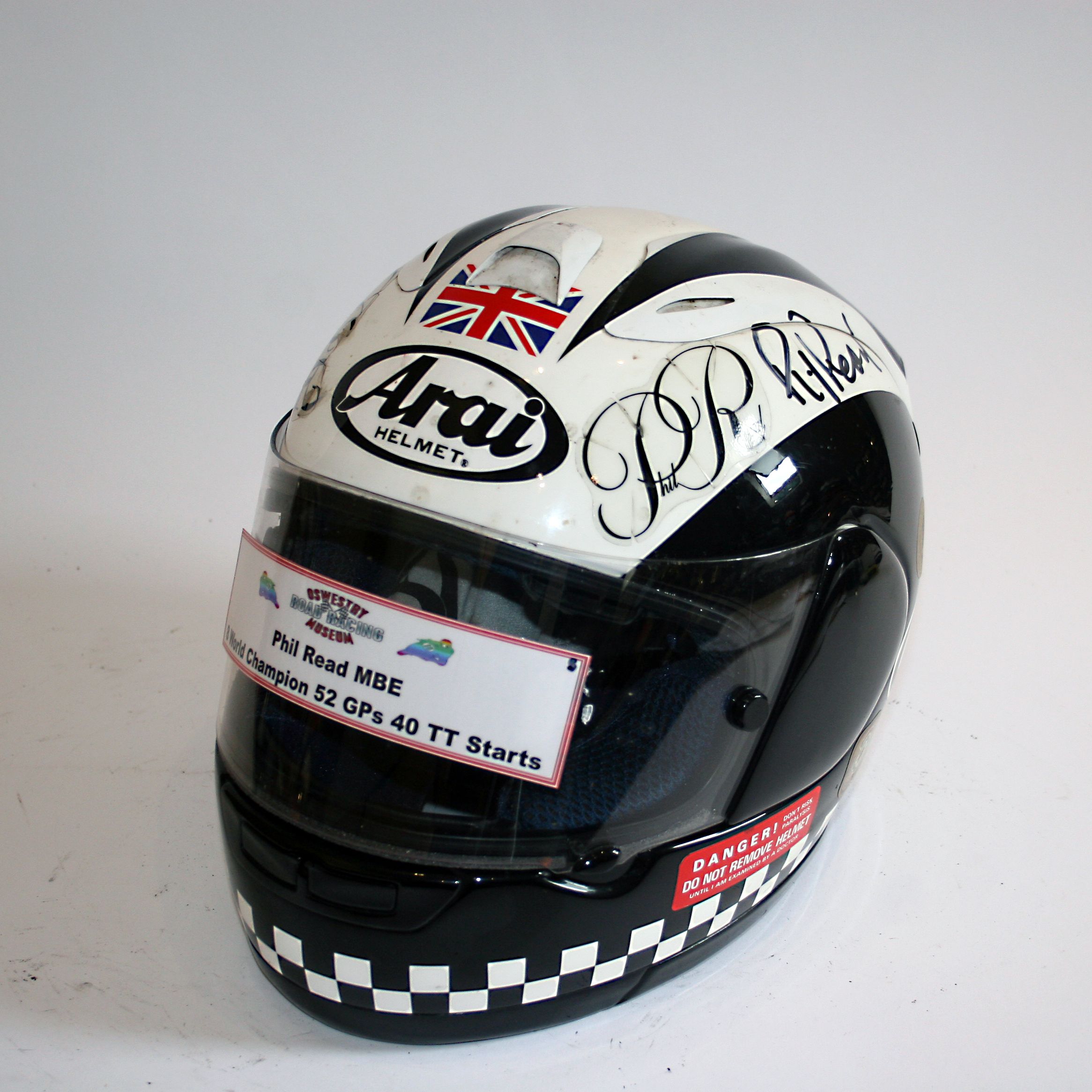 Bonhams Cars : Phil Read A signed full-face helmet by Arai, dated 12/96