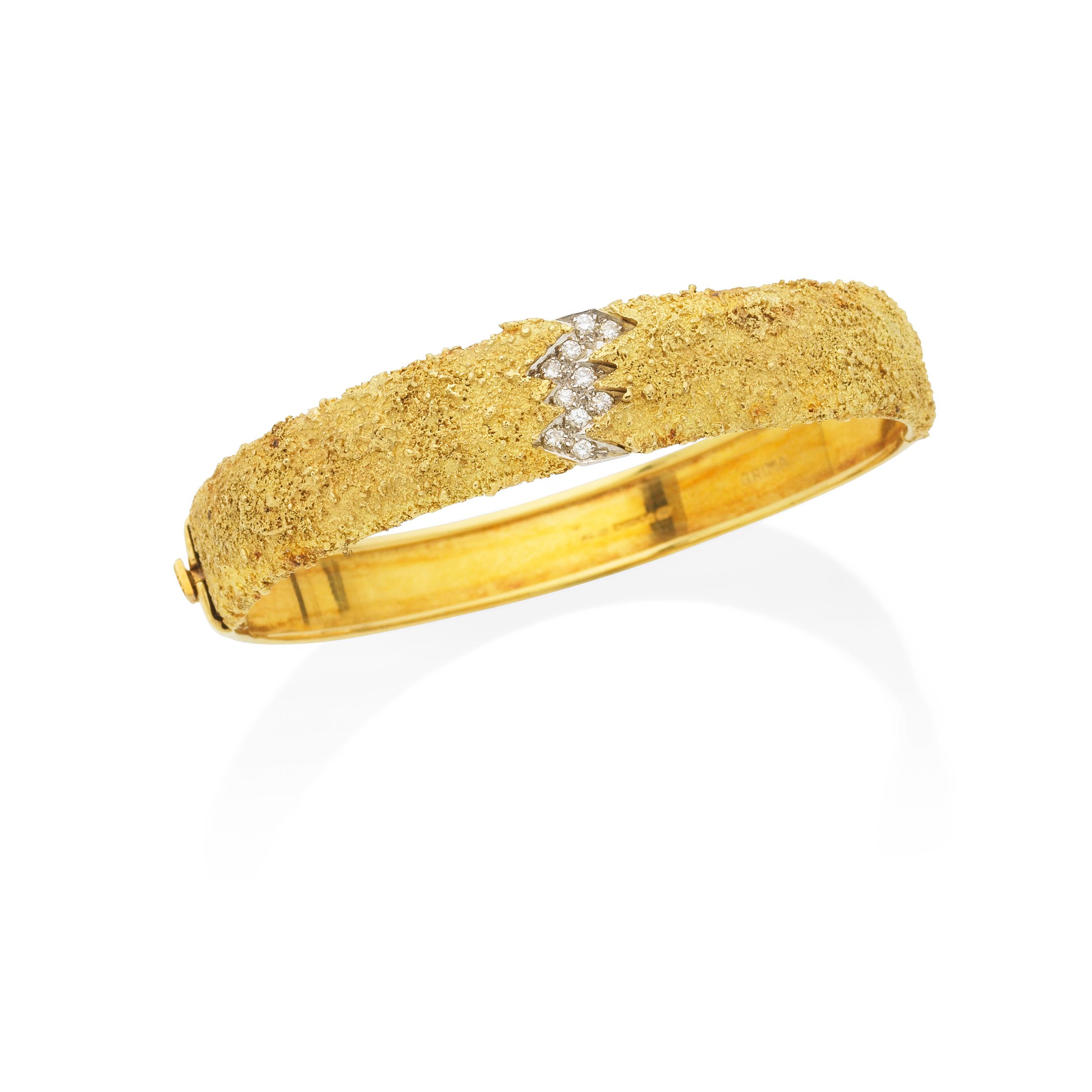 Bonhams : GRIMA DIAMOND-SET GOLD BANGLE, 1986