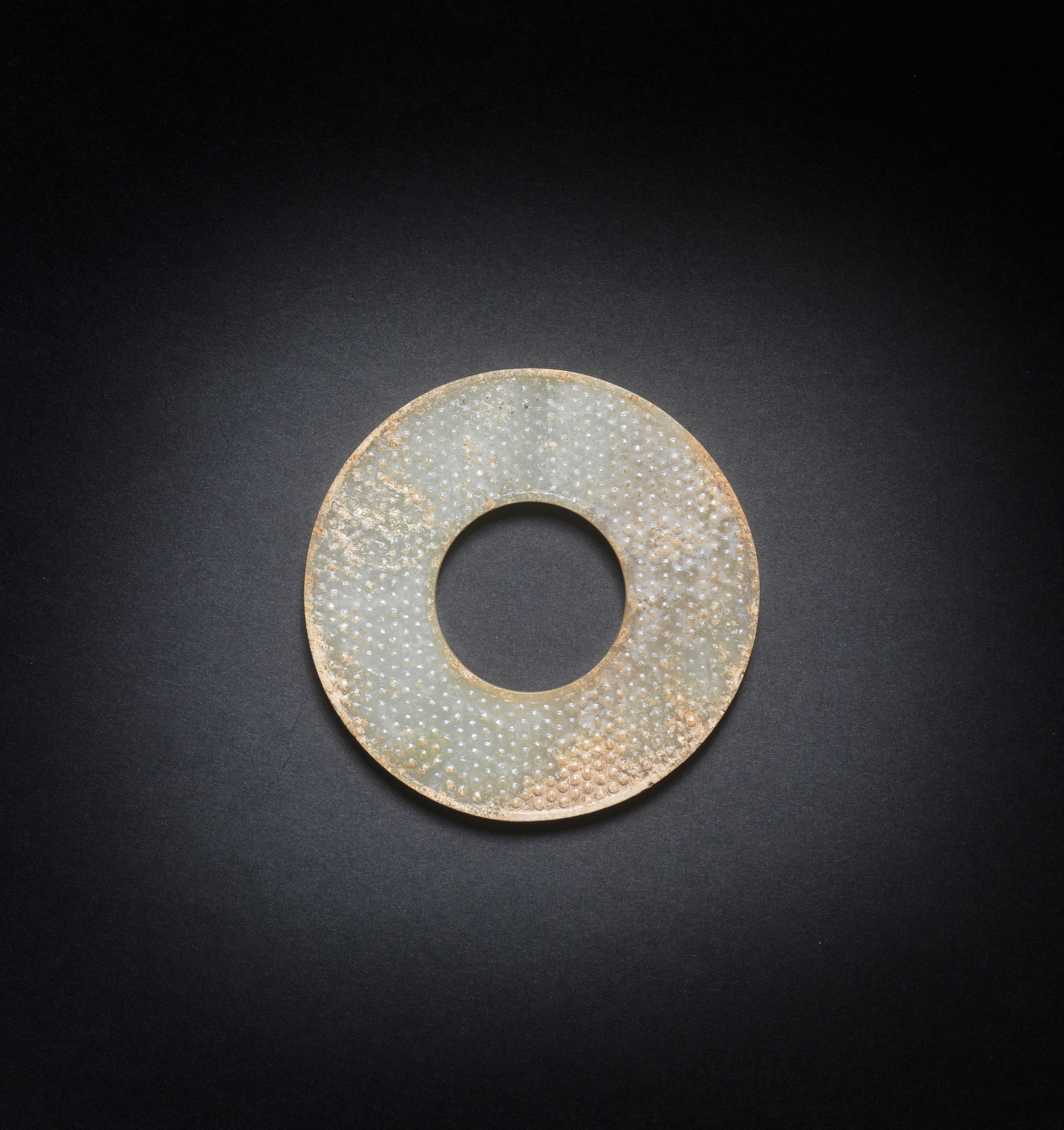 Bonhams : AN ARCHAIC JADE DISC, BI Warring States Period