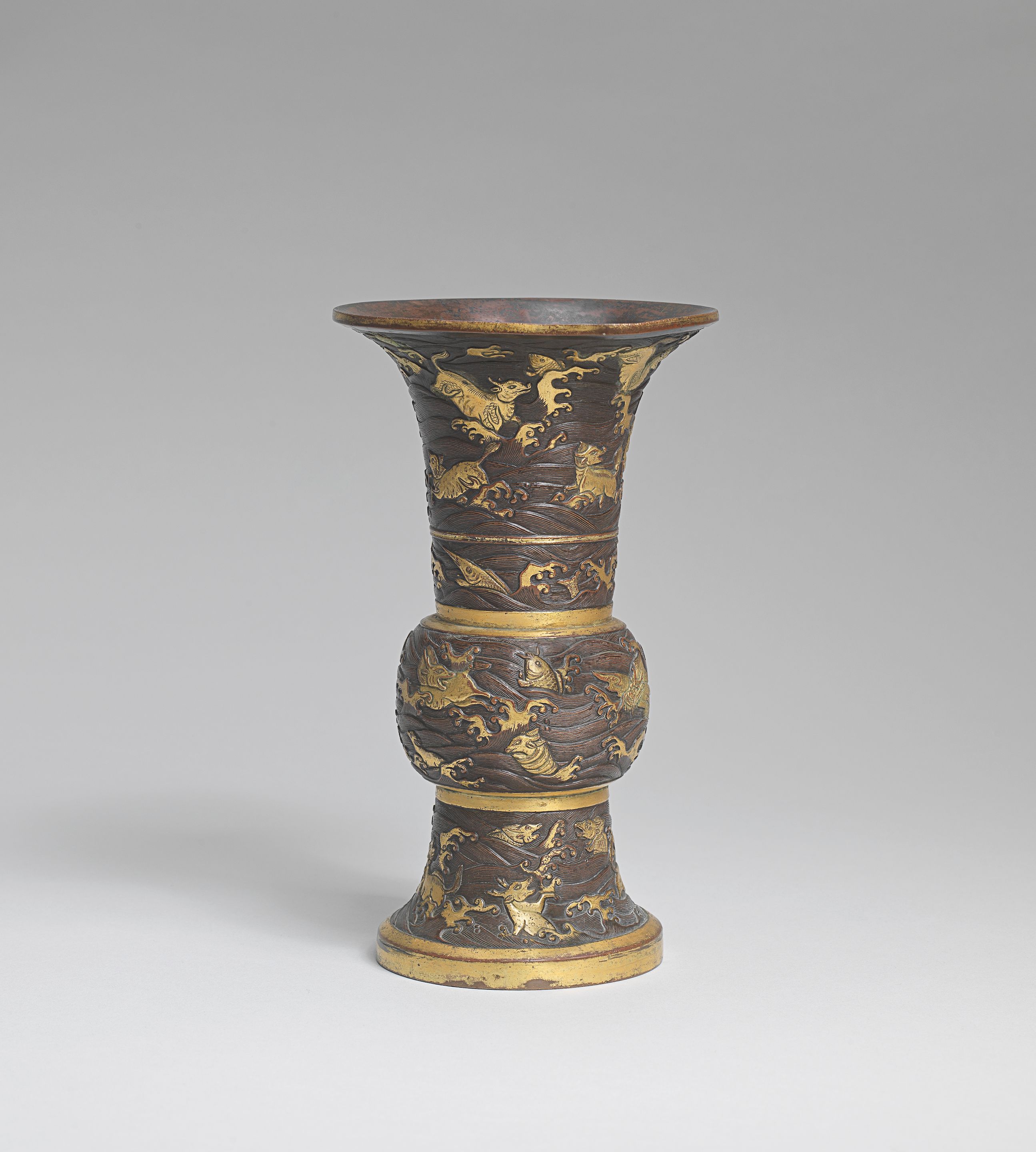 Bonhams : A PARCEL-GILT-BRONZE 'MYTHICAL BEASTS' VASE, GU 17th century