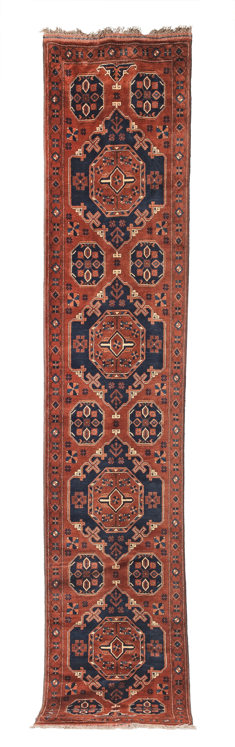 Bonhams : An Esari runner Afghanistan, 435cm x 88cm