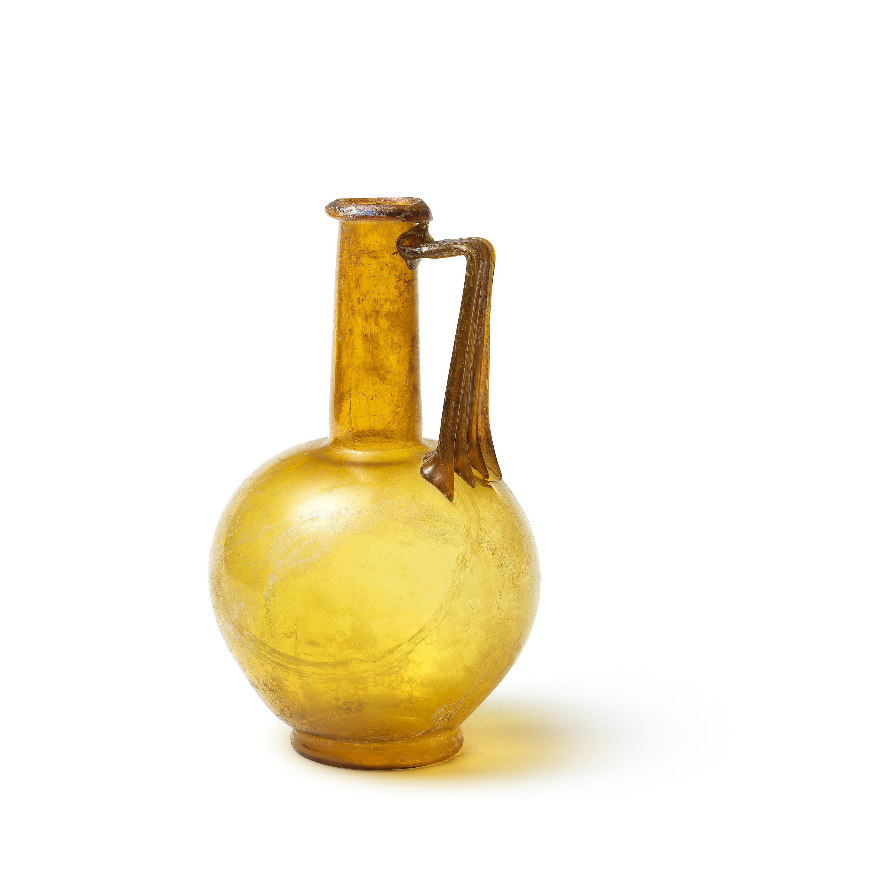 Bonhams A Large Roman Amber Glass Tall Necked Jug