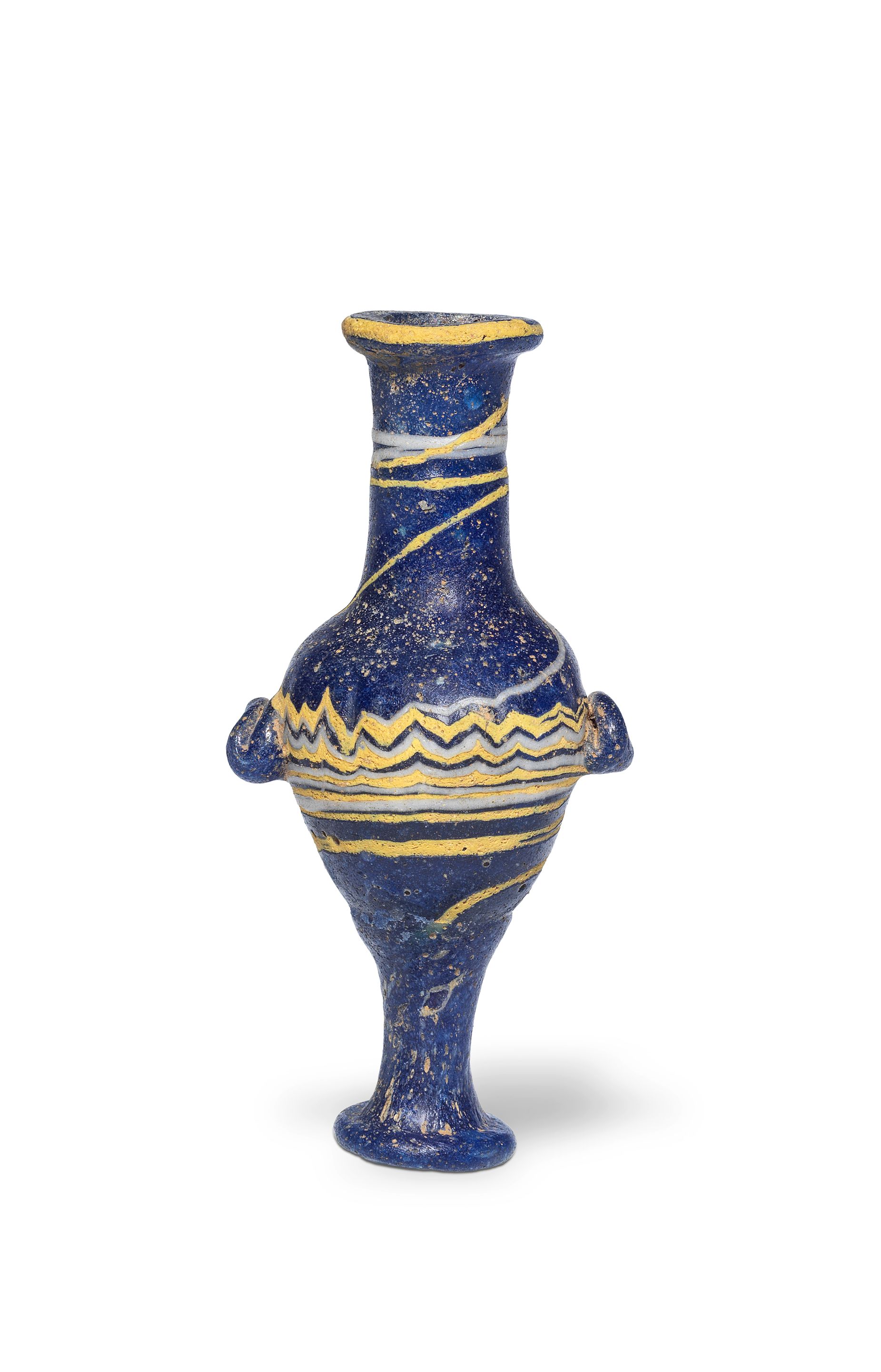 Bonhams : A Greek core-formed glass unguentarium