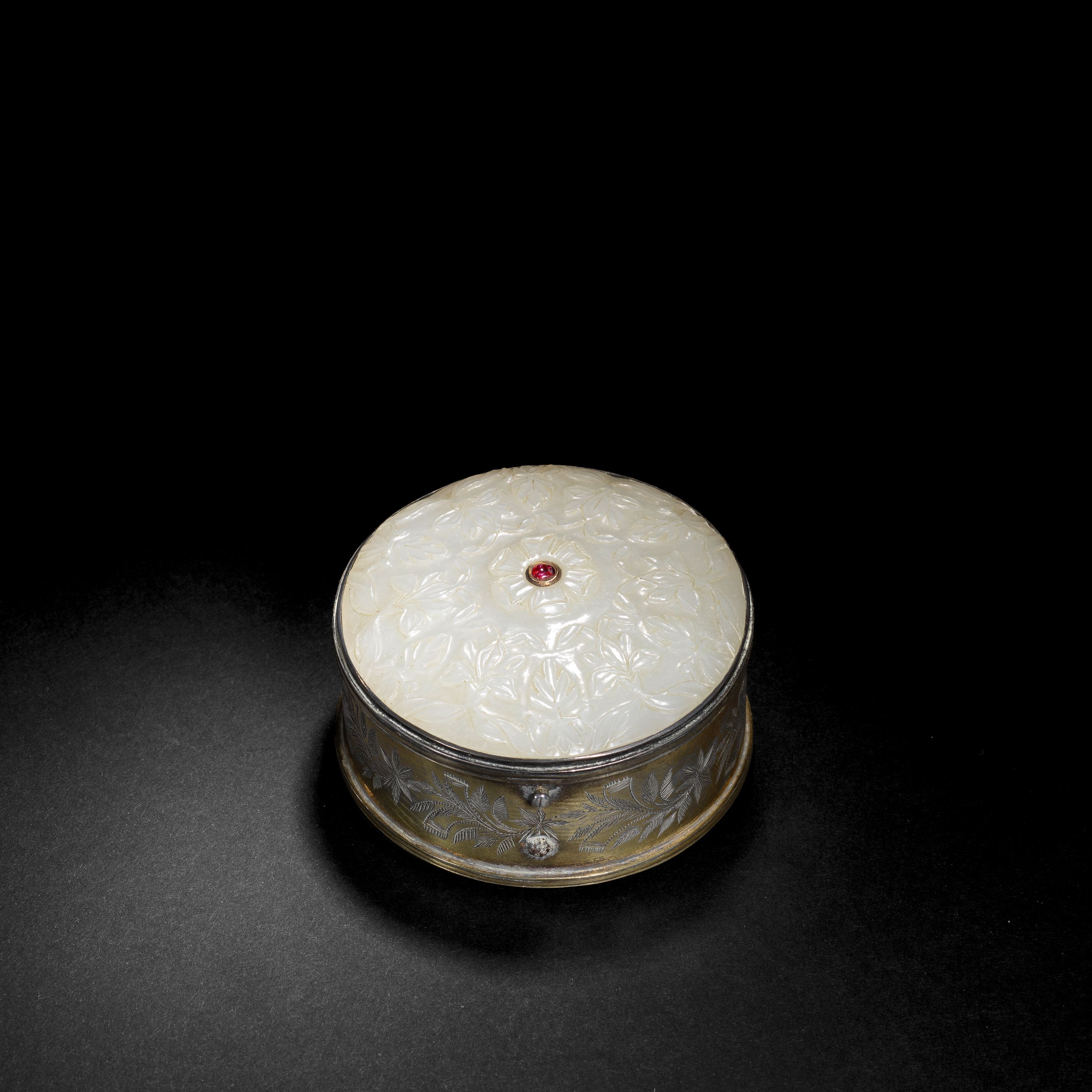 Bonhams : A Mughal ruby-set white jade lid mounted as a box India, 18th ...
