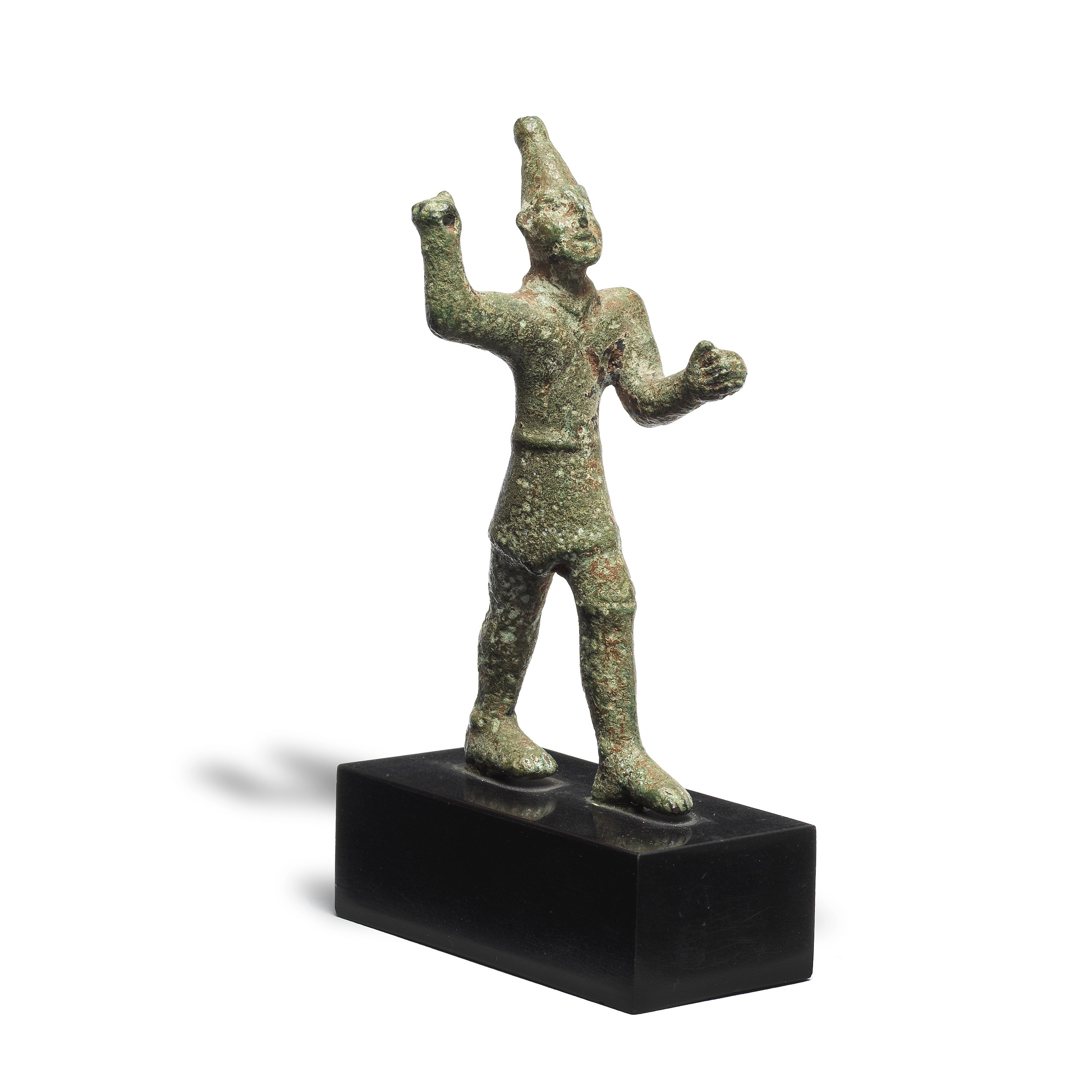 Bonhams : A Canaanite bronze smiting god