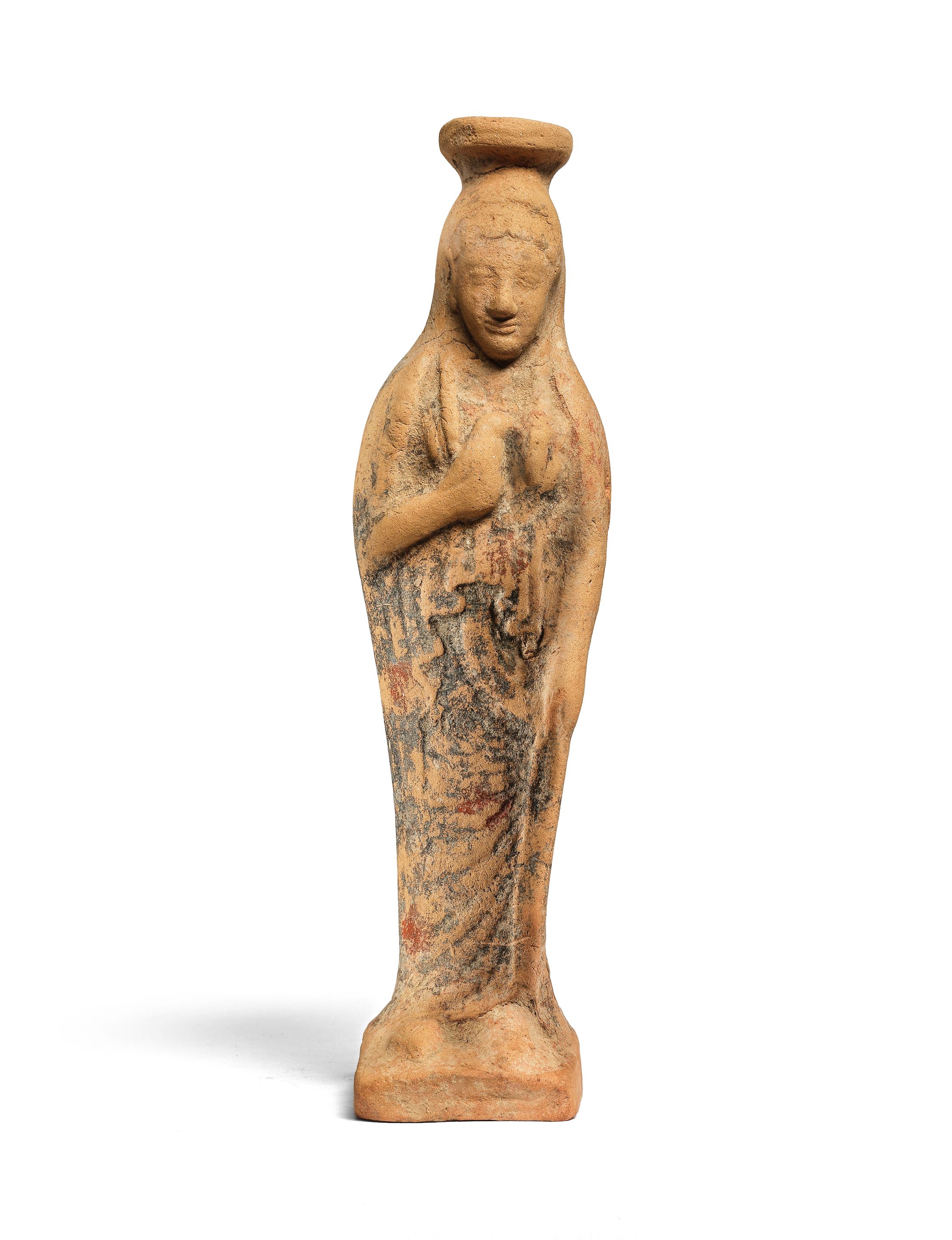 Bonhams : An East Greek 'plastic' alabastron of a female figure