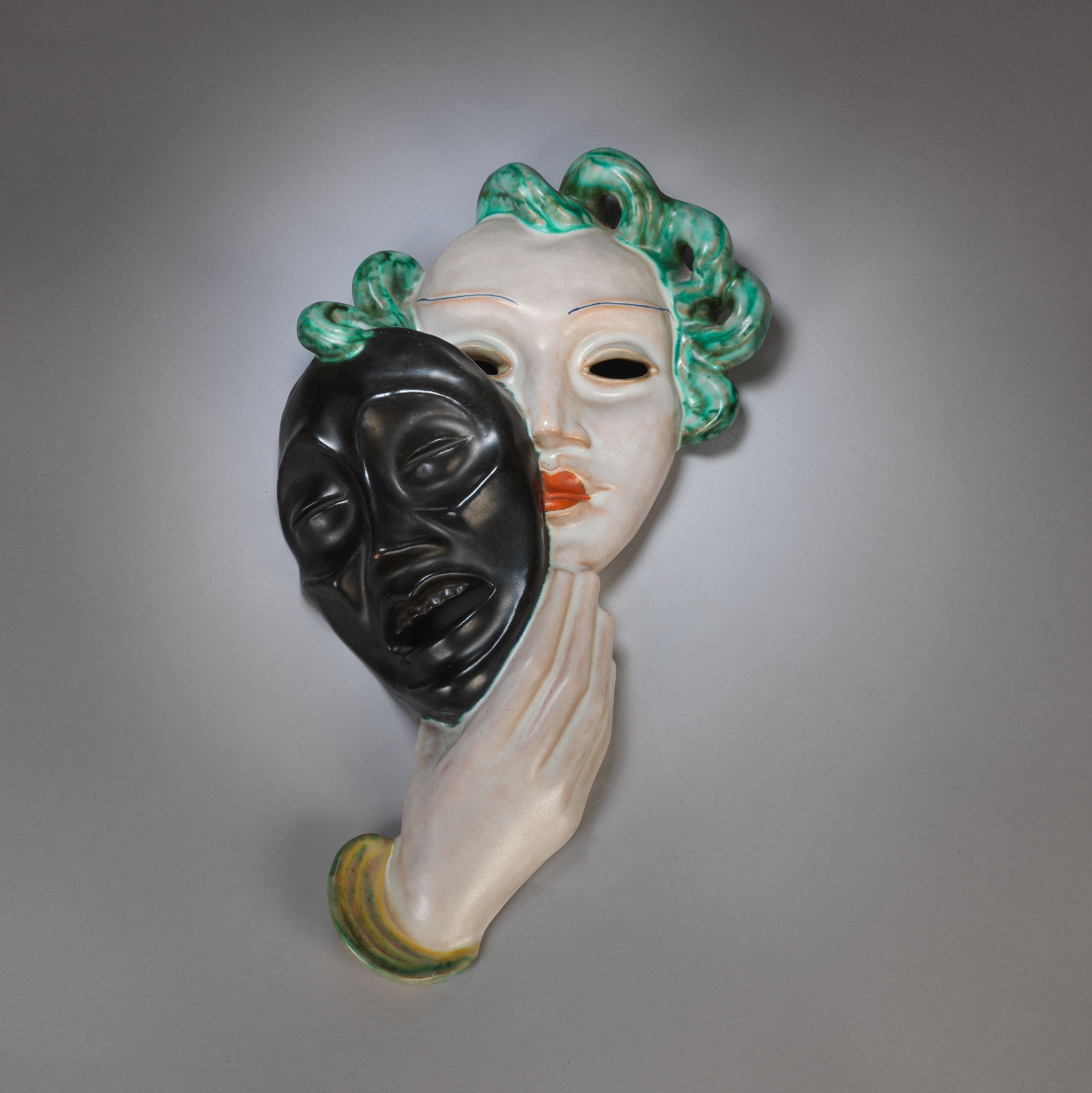 Bonhams : GOLDSCHEIDER Theatrical wall mask, model no. 6288, circa 1929