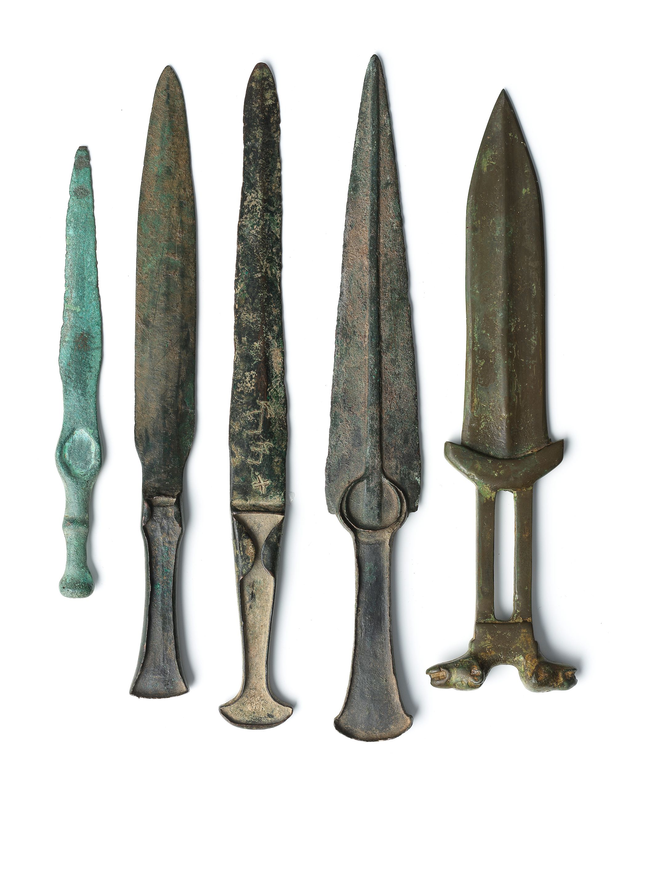 Bonhams : Three Luristan bronze daggers and two Central Asian bronze daggers 5