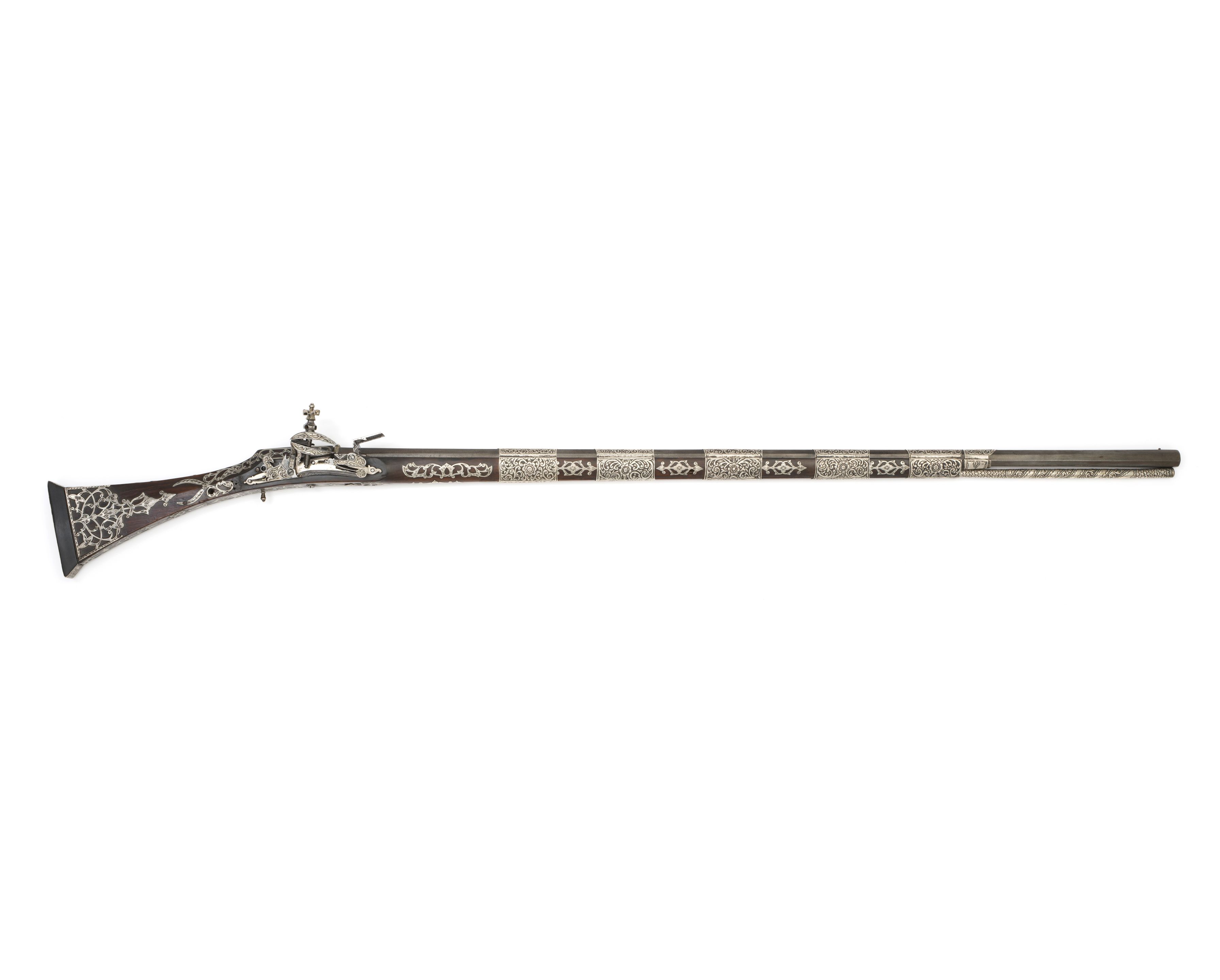 Bonhams : A silver-mounted miquelet rifle Algeria, dated AH 1263/ AD 1846