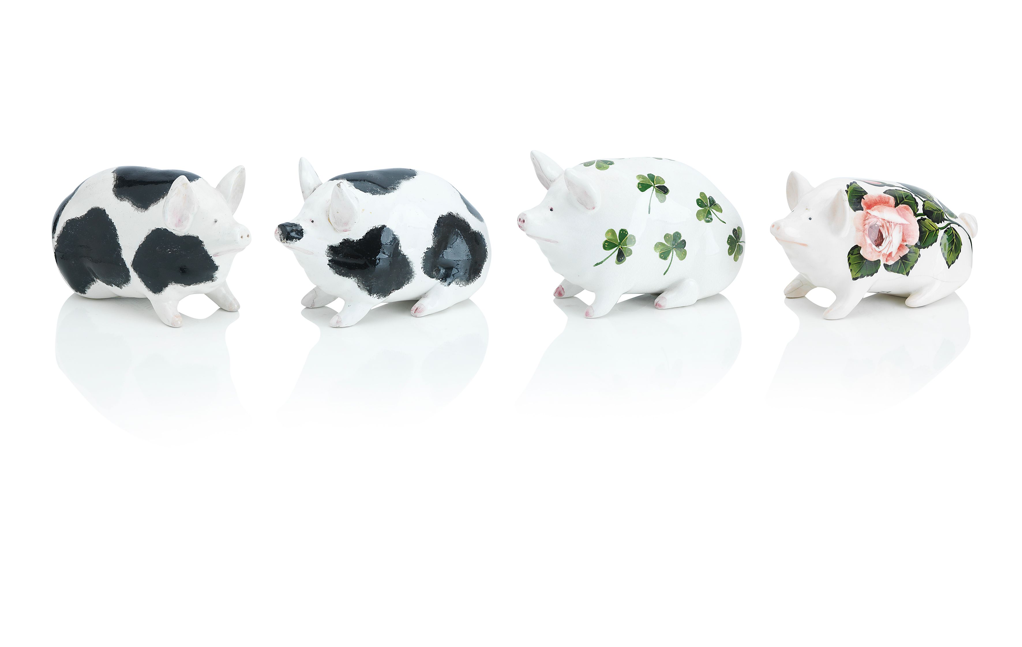 Bonhams : Two 'Black and White' Wemyss Pigs and two similar pigs
