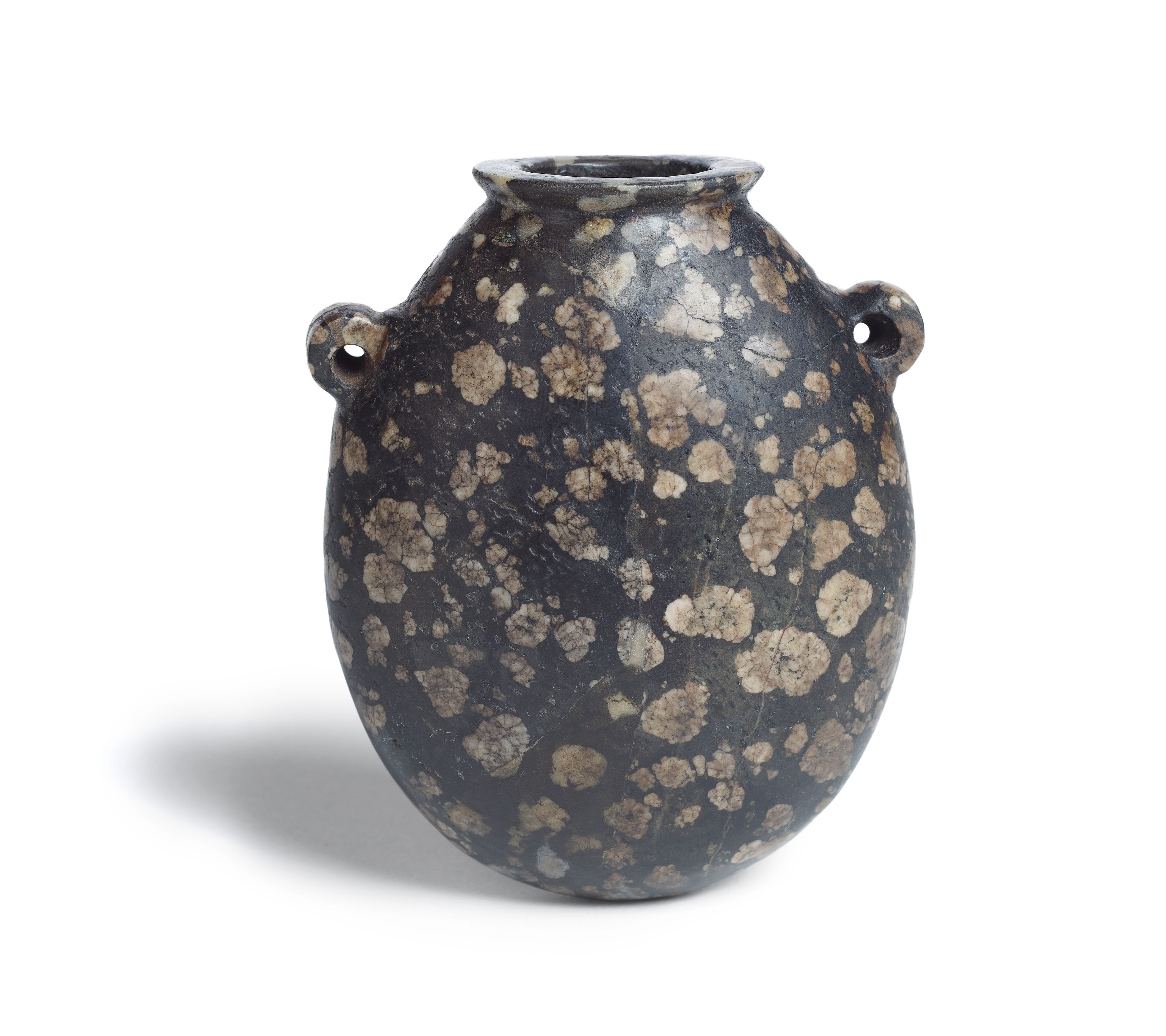 Bonhams : An Egyptian andesite porphyry flattened jar