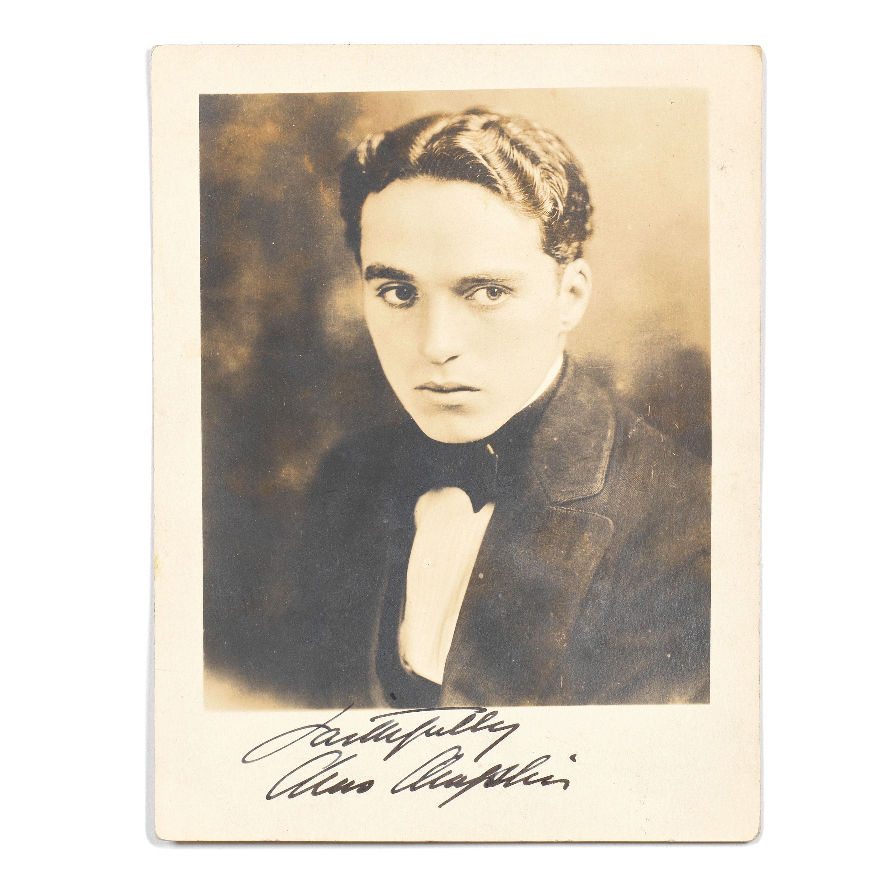Bonhams : Charlie Chaplin A Signed Postcard Photograph, circa 1910,