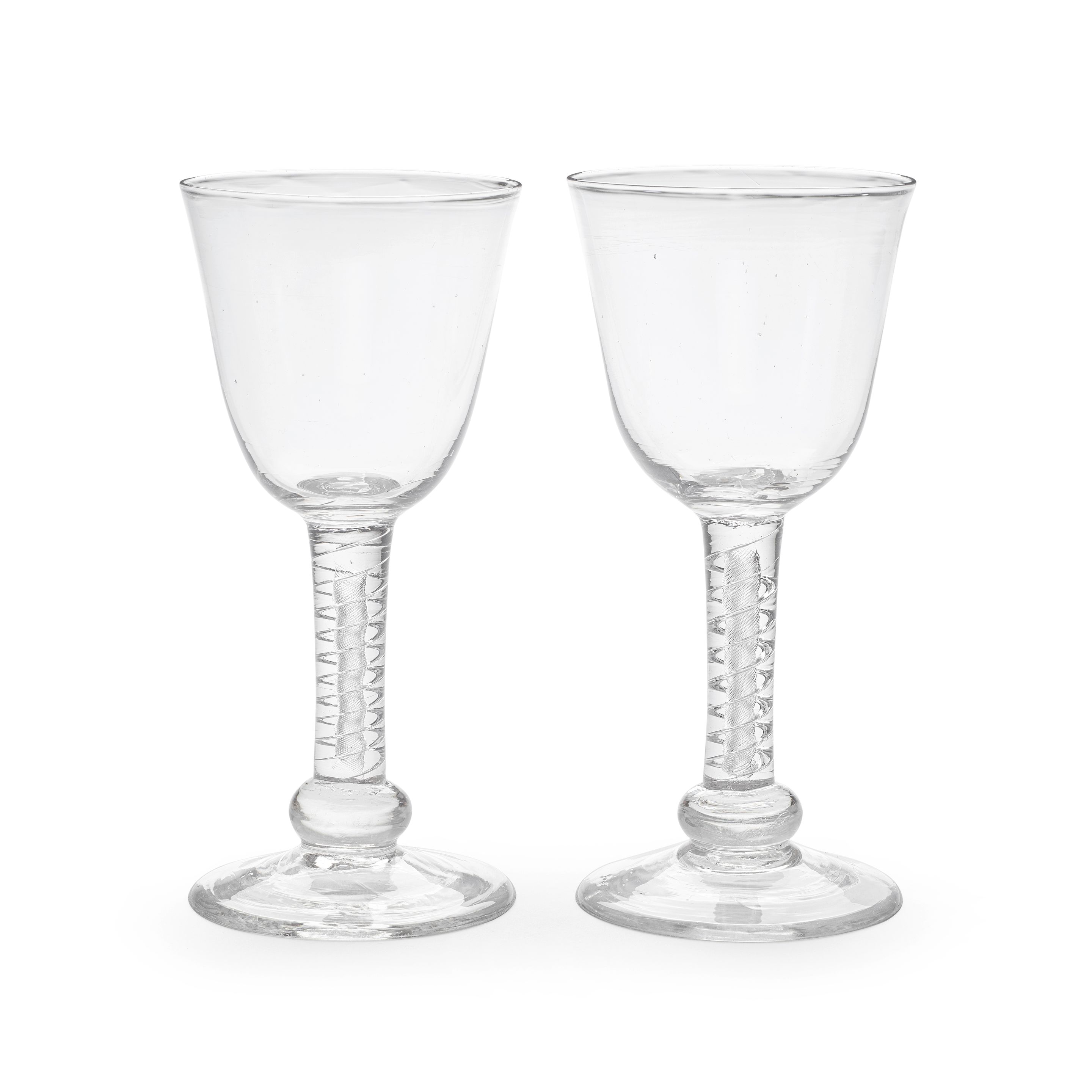 Bonhams : A fine pair of composite stem baluster goblets, circa 1750
