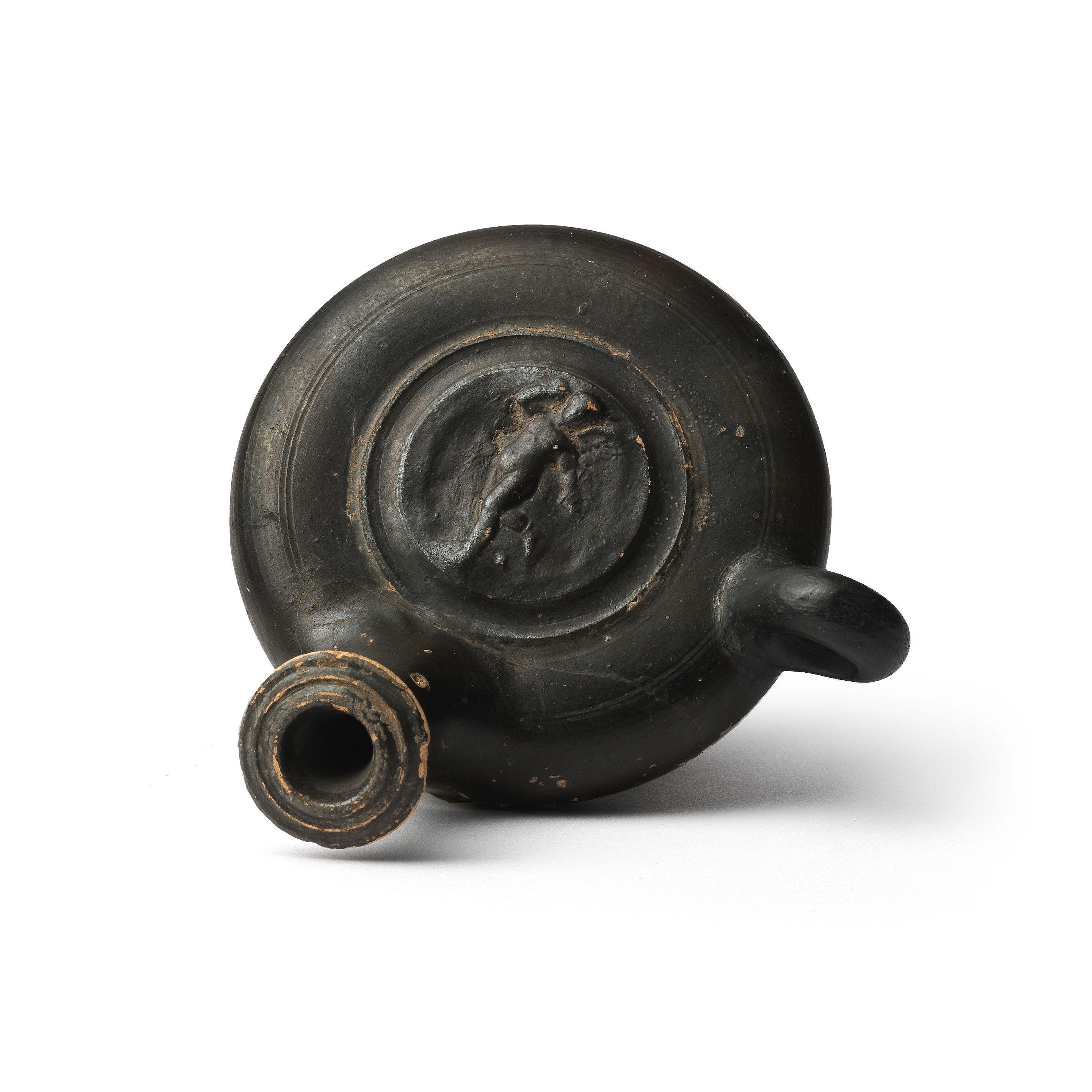 Bonhams : A Greek Calene ware black-glazed guttus