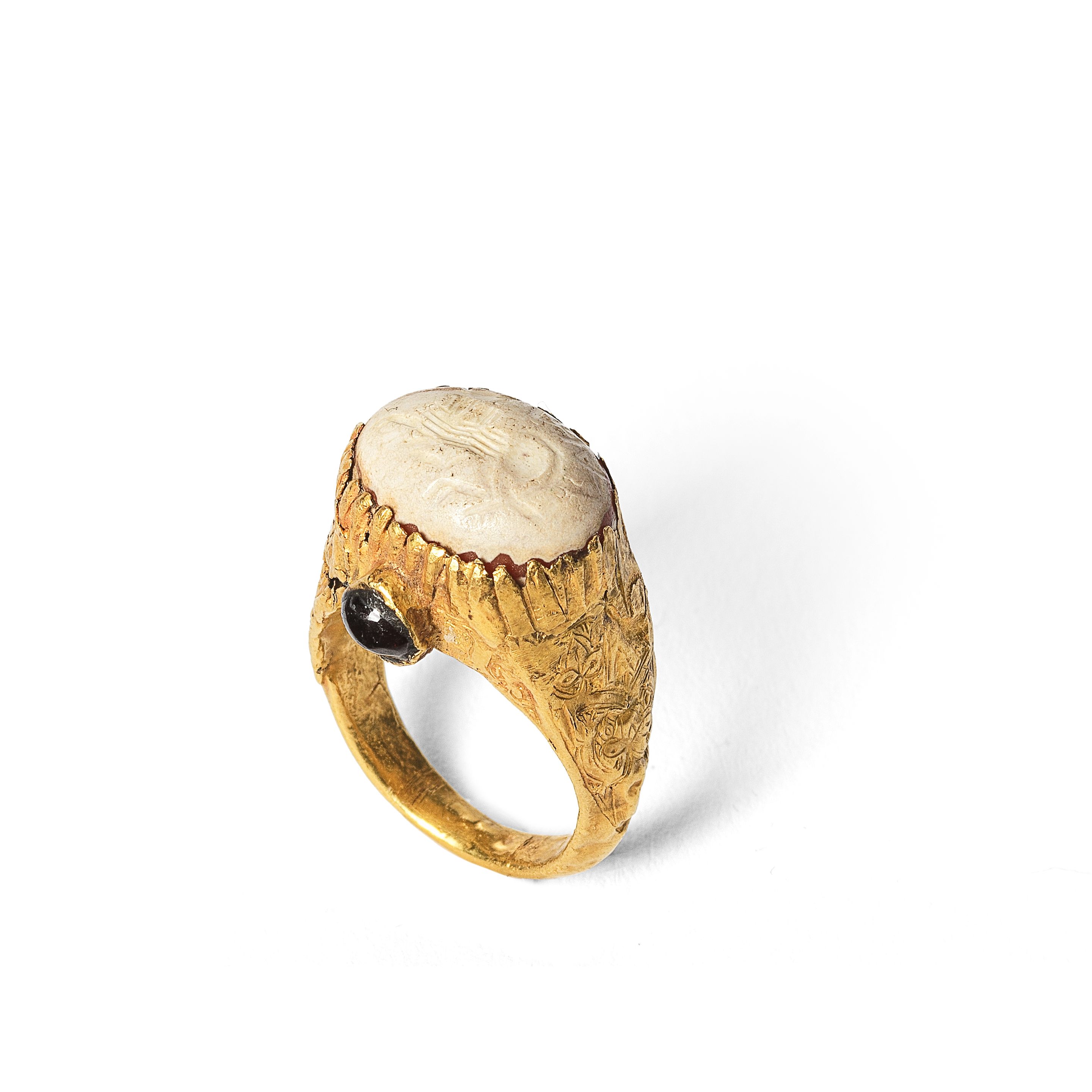 Bonhams : A Near Eastern gold sheet ring with incised banded agate ...