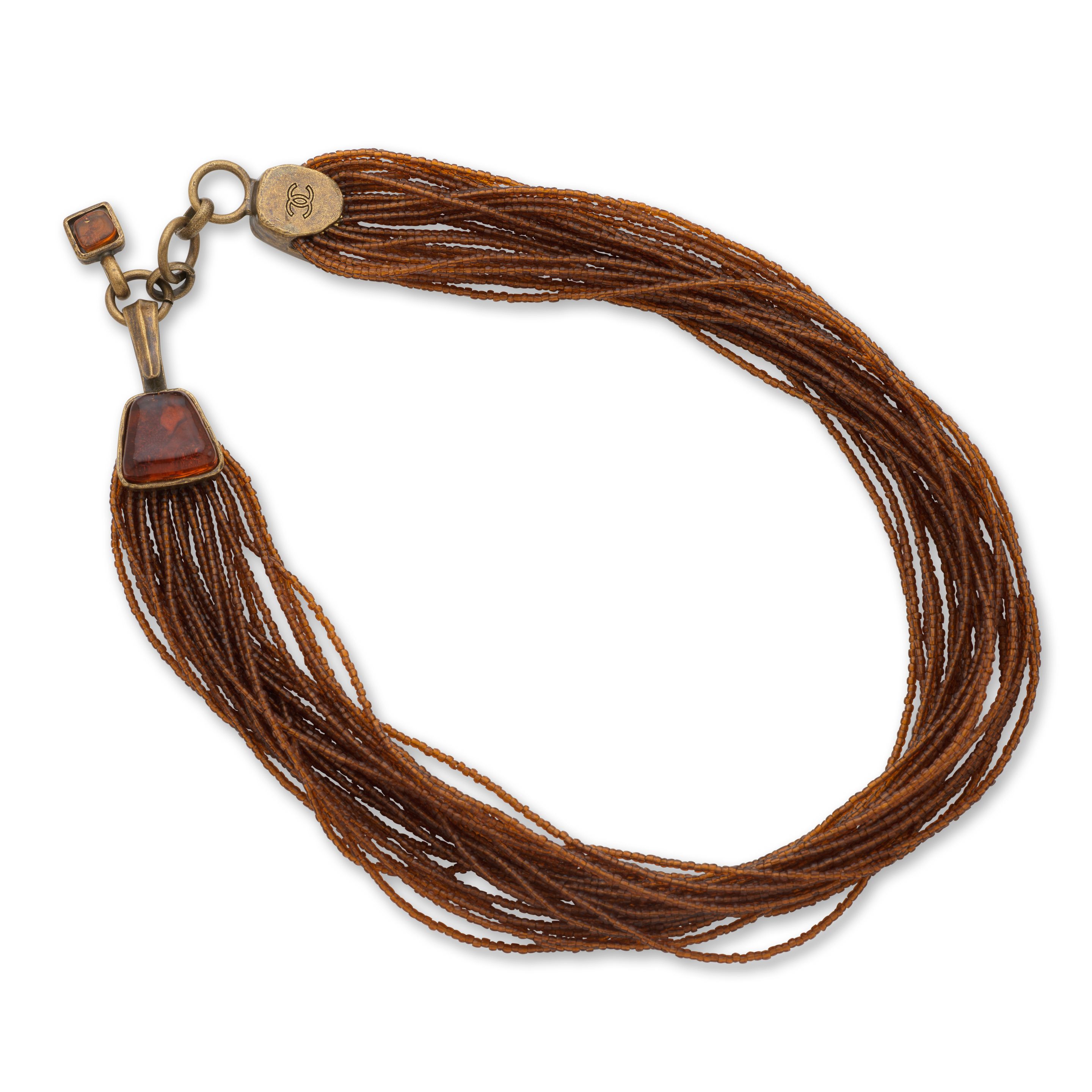 Bonhams Cornette de Saint Cyr : CHANEL Prototype, circa 1990. Collier multi rangs caramel.