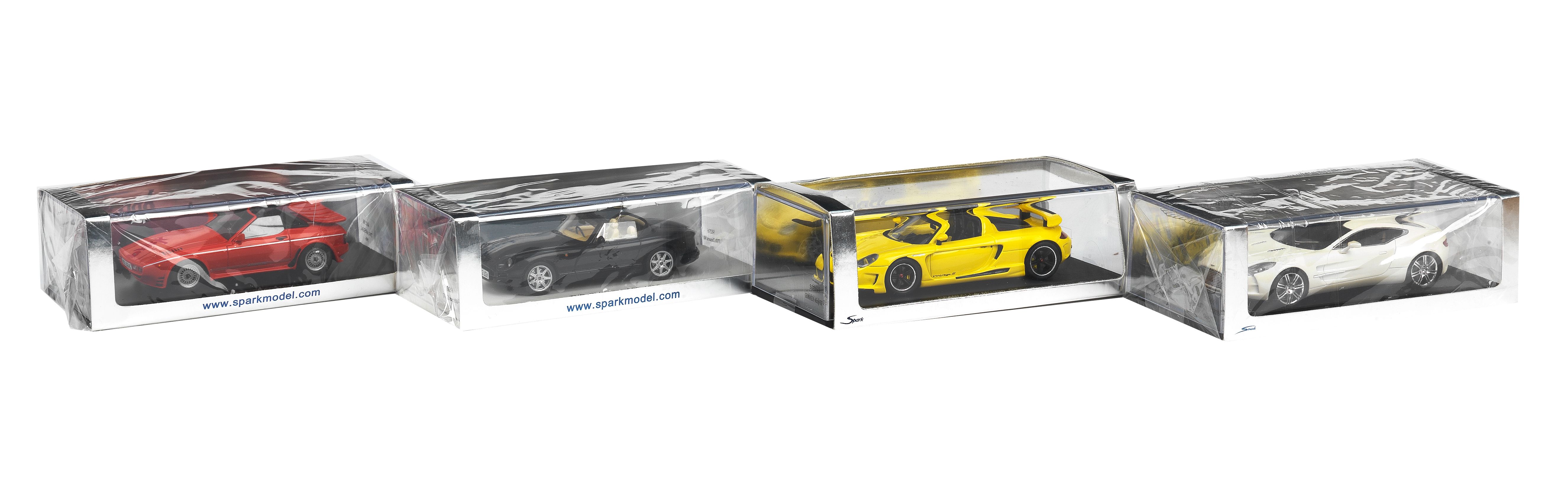 Bonhams Cars : Four boxed 143 scale die-cast models of sports cars by ...
