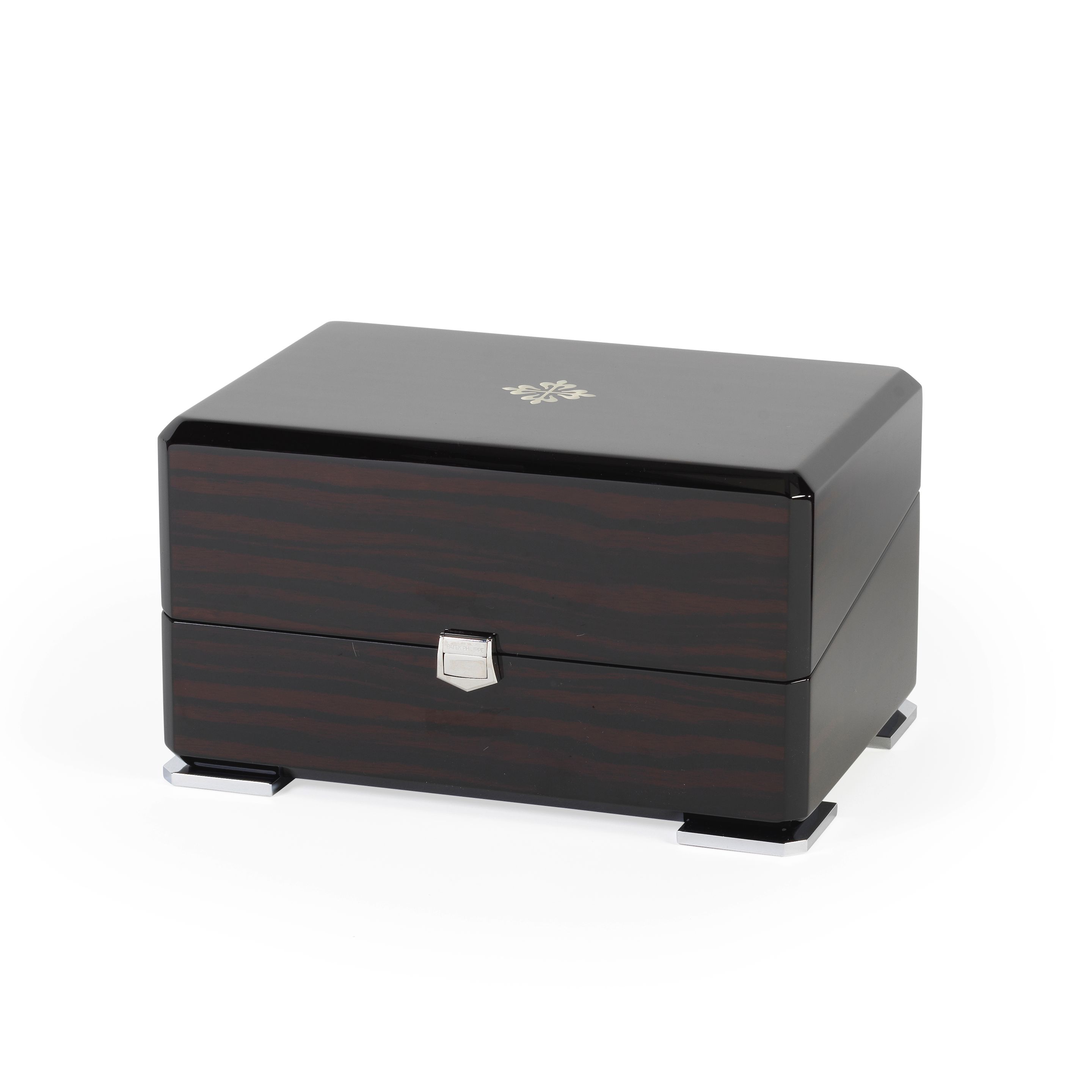 Bonhams : Patek Philippe. An electronic winding box for a Perpetual ...