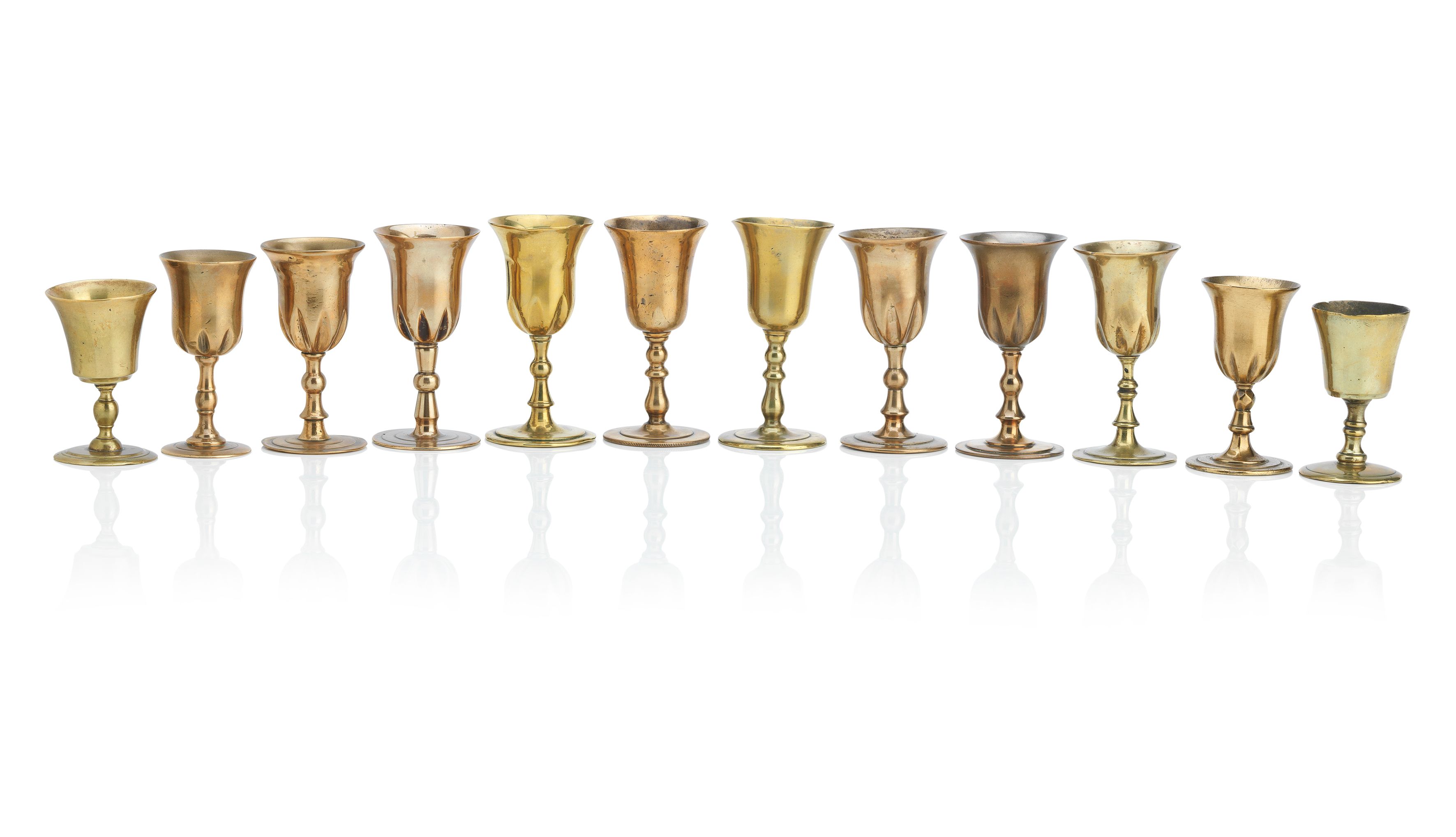 Bonhams : Twelve Scottish copper alloy travelling communion cups 18th ...