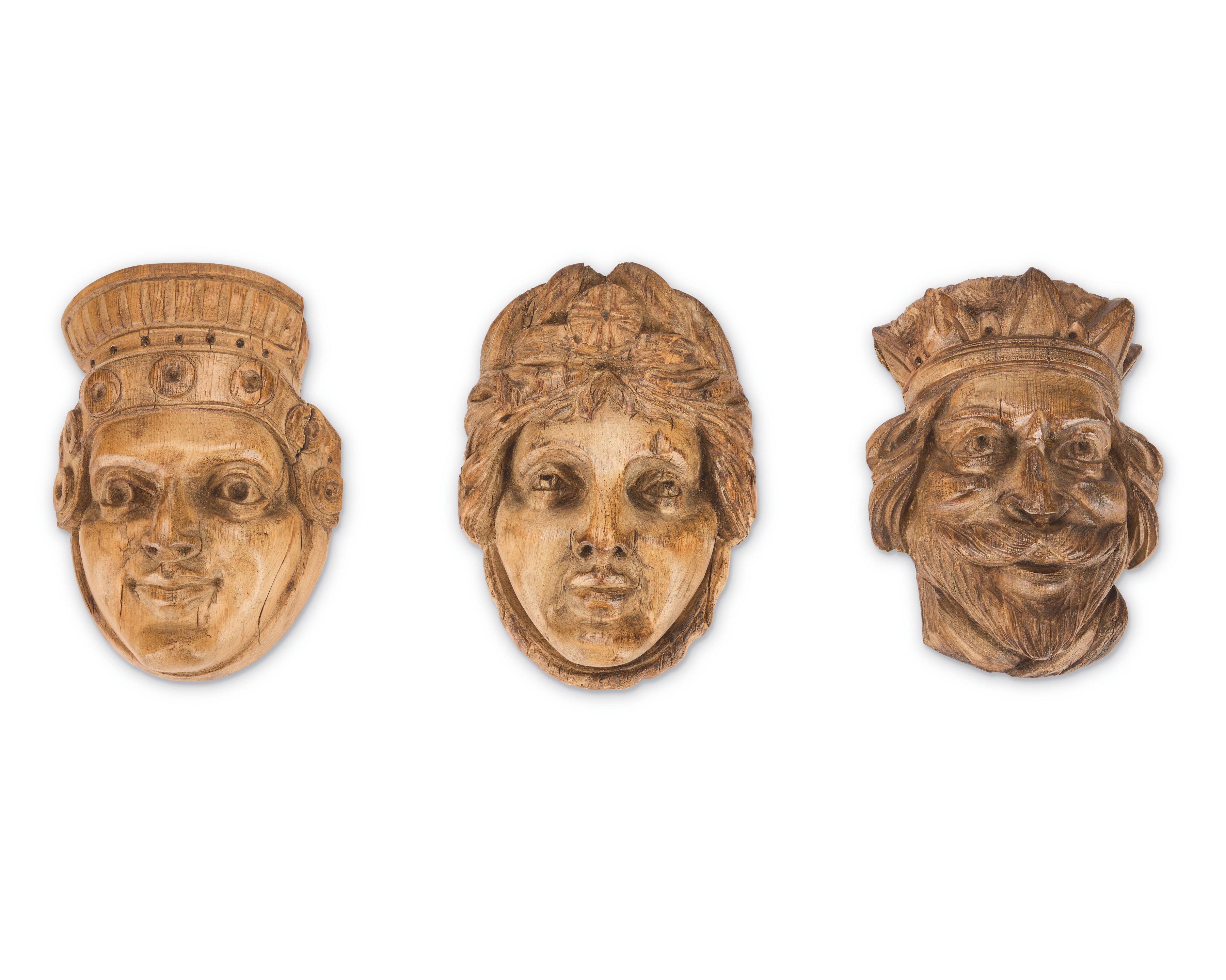 Bonhams : A set of three English carved and stripped limewood masks of ...