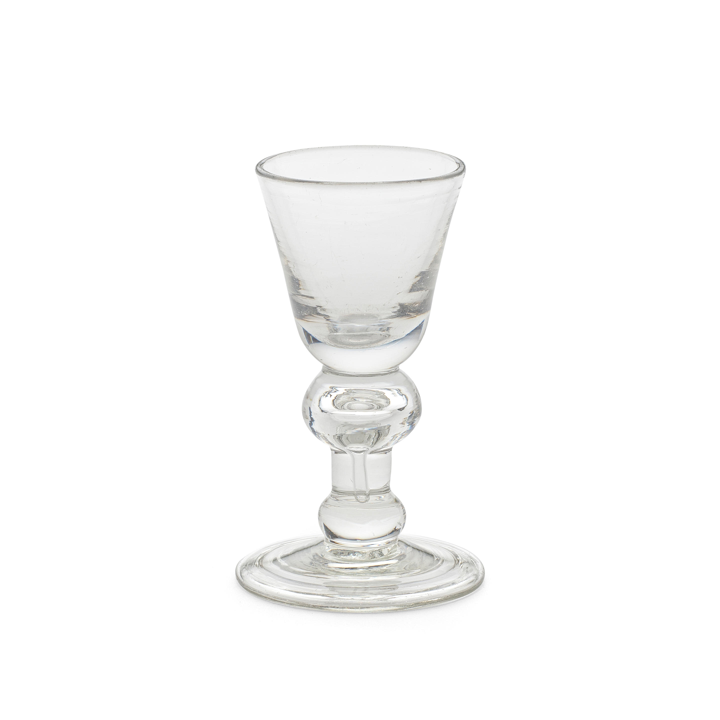 Bonhams : An attractive heavy baluster small wine or dram glass, circa ...