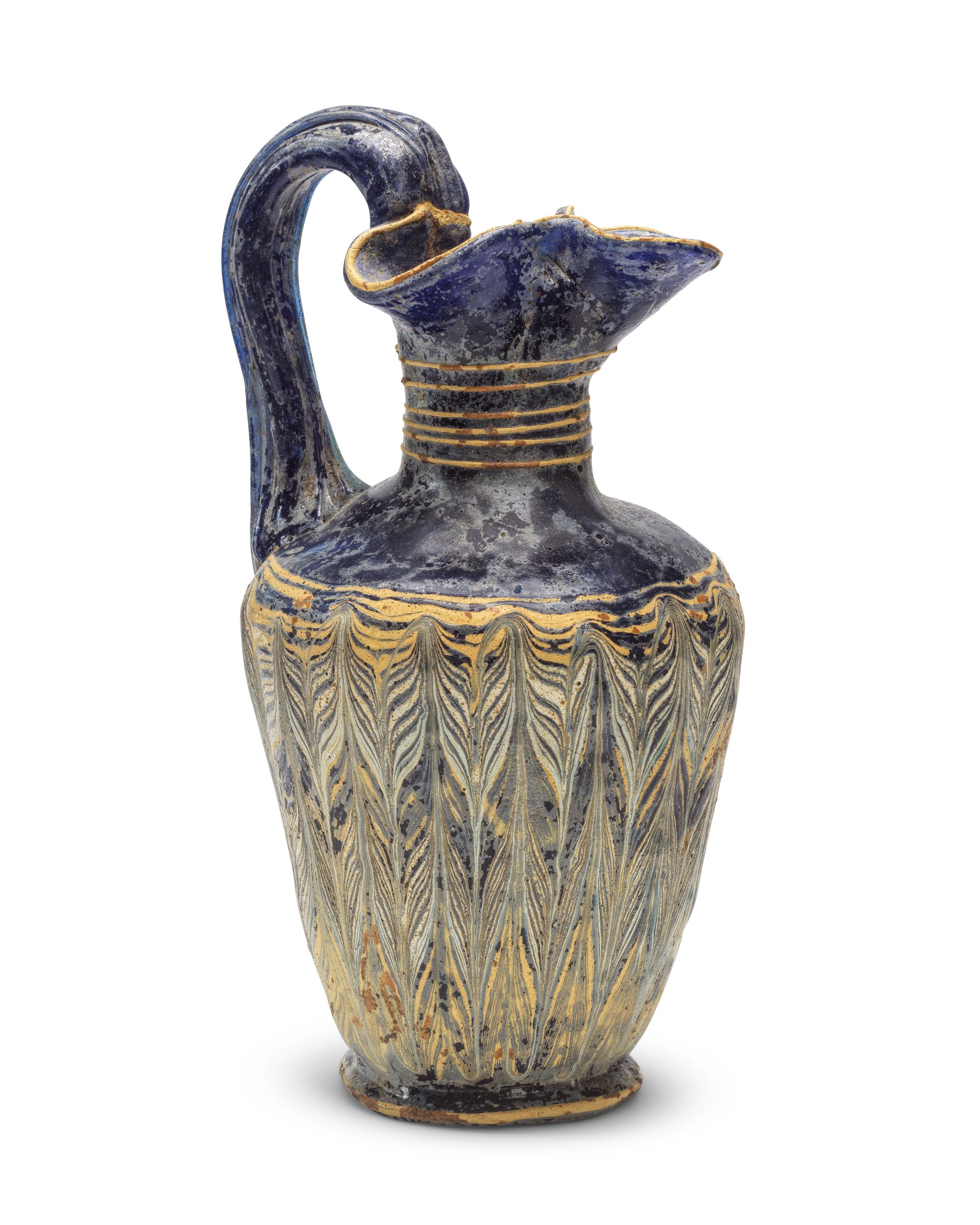 Bonhams : A large Greek core-formed glass trefoil-lipped oinochoe