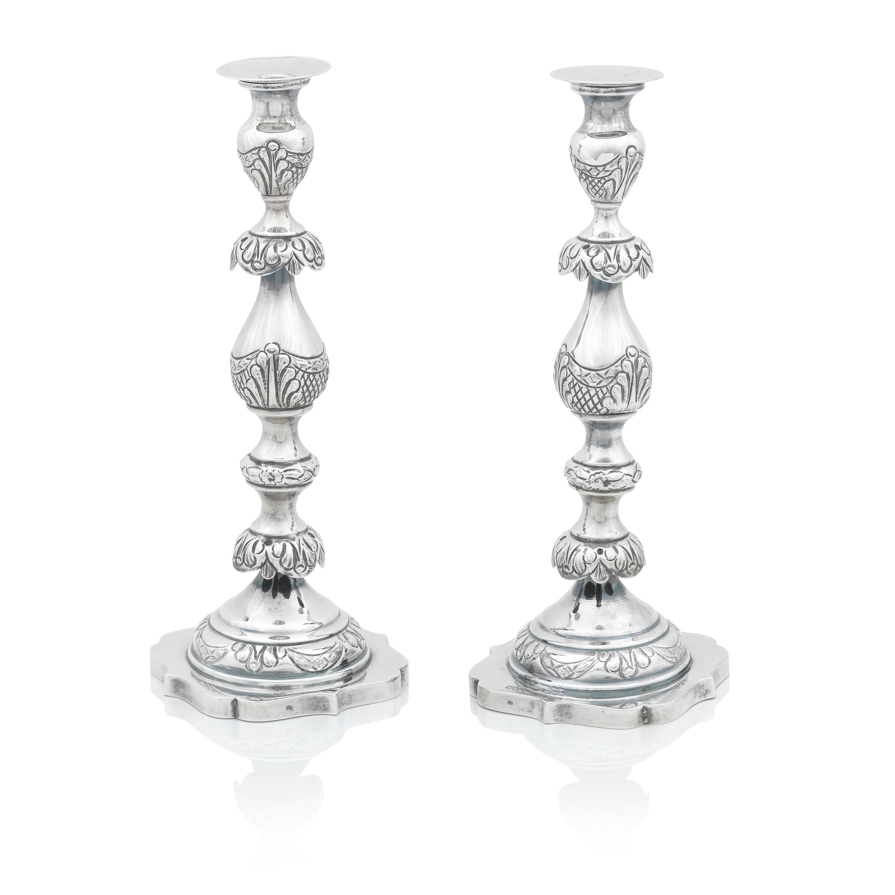 Bonhams : A pair of George V silver sabbath candlesticks Probably by ...
