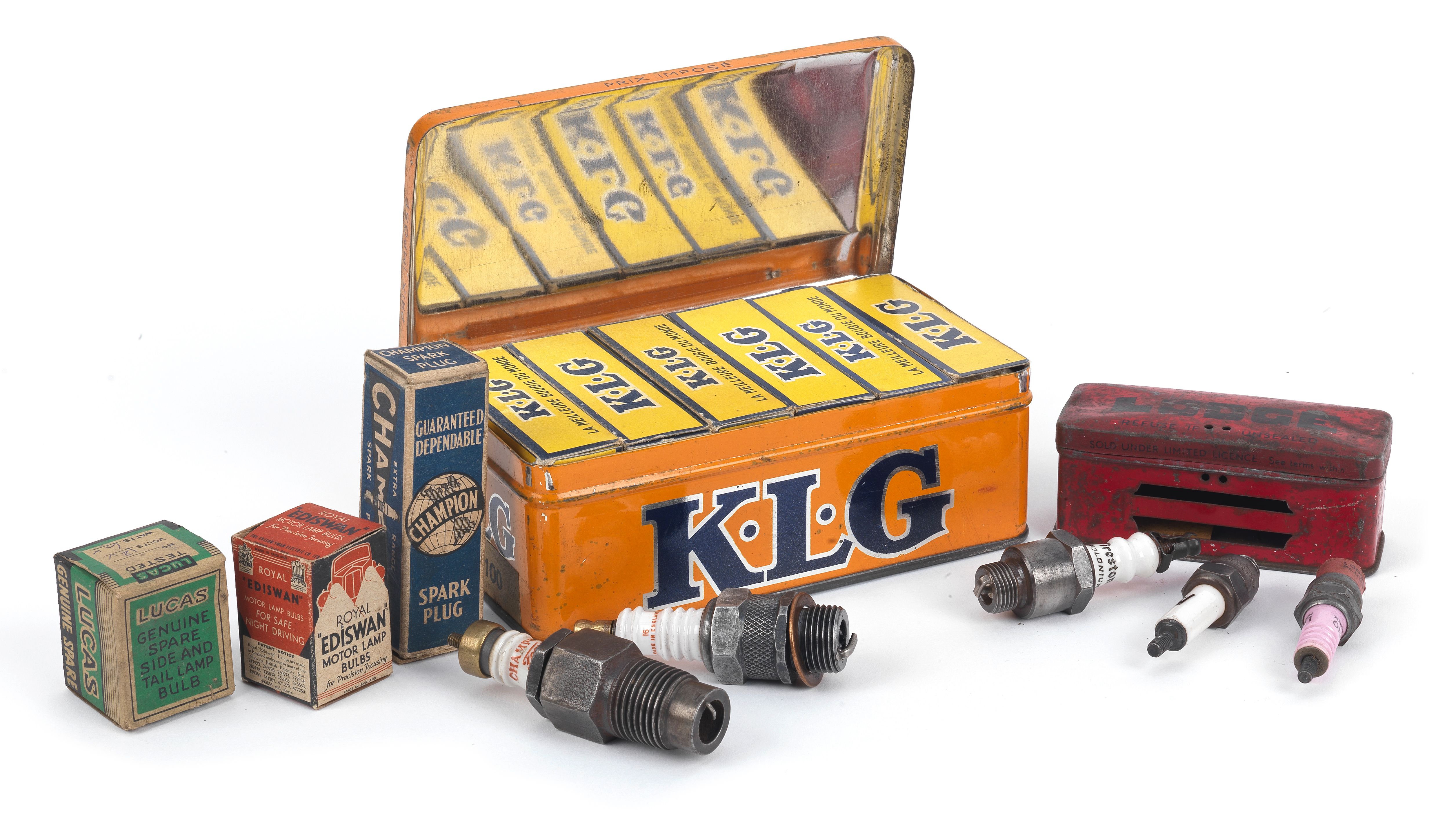 Bonhams Cars : A KLG display tin housing 12 boxed KLG spark plugs, ((Qty))