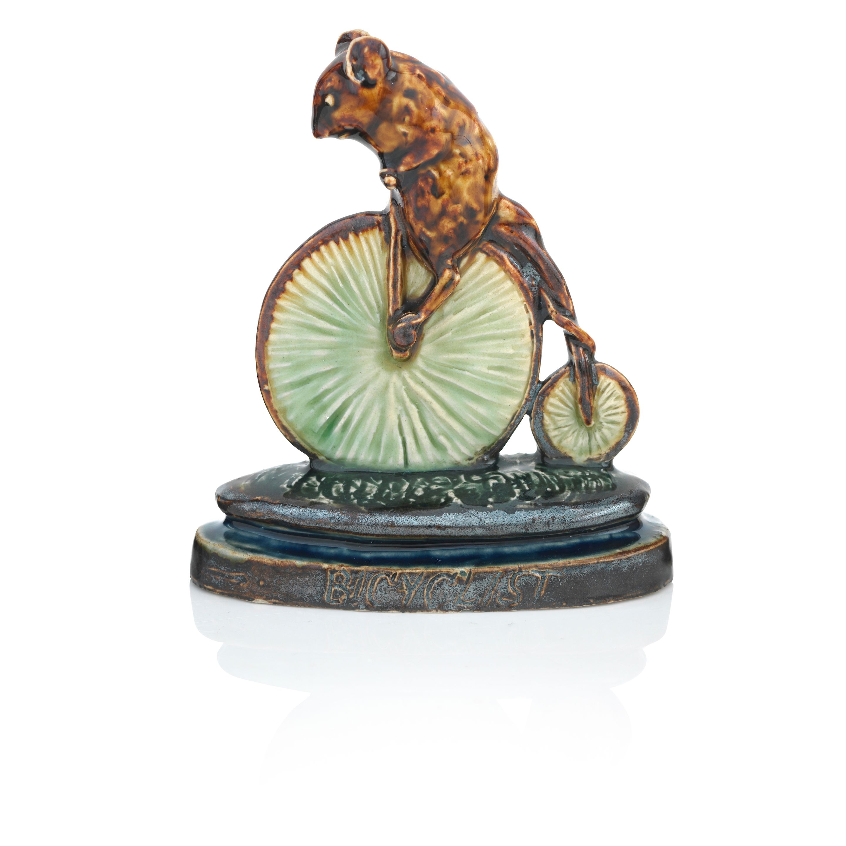 Bonhams : George Tinworth for Doulton Lambeth 'Bicyclist' A glazed ...