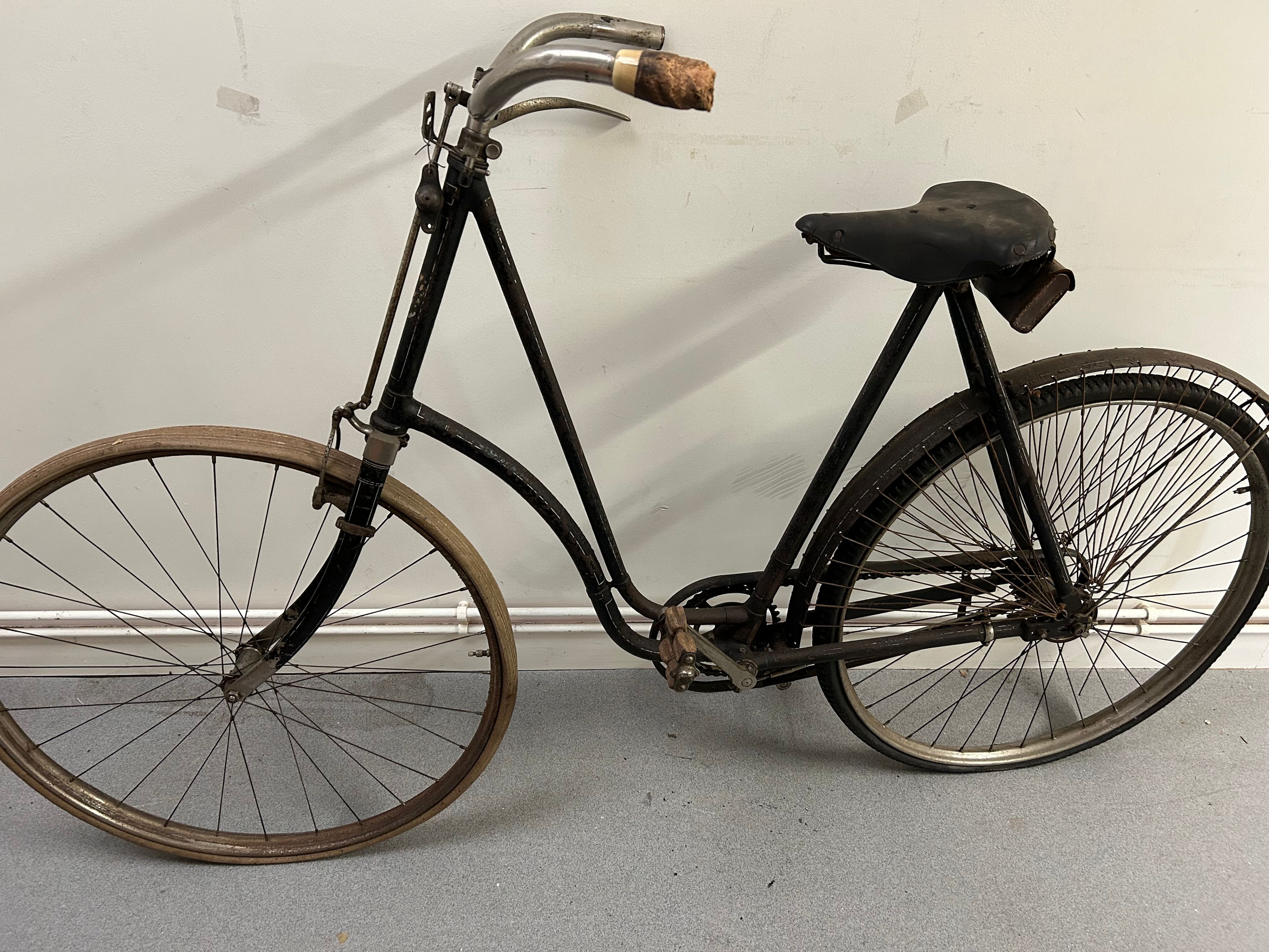 Bonhams Cars : A ladies loop frame bicycle, 23 inch frame
