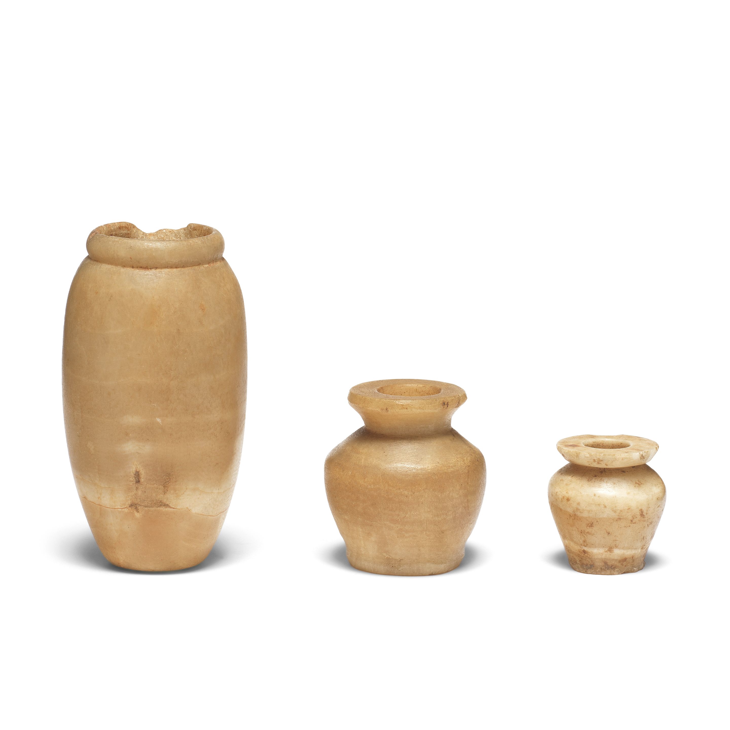 Bonhams : Two Egyptian alabaster cosmetic jars and an Egyptian ...